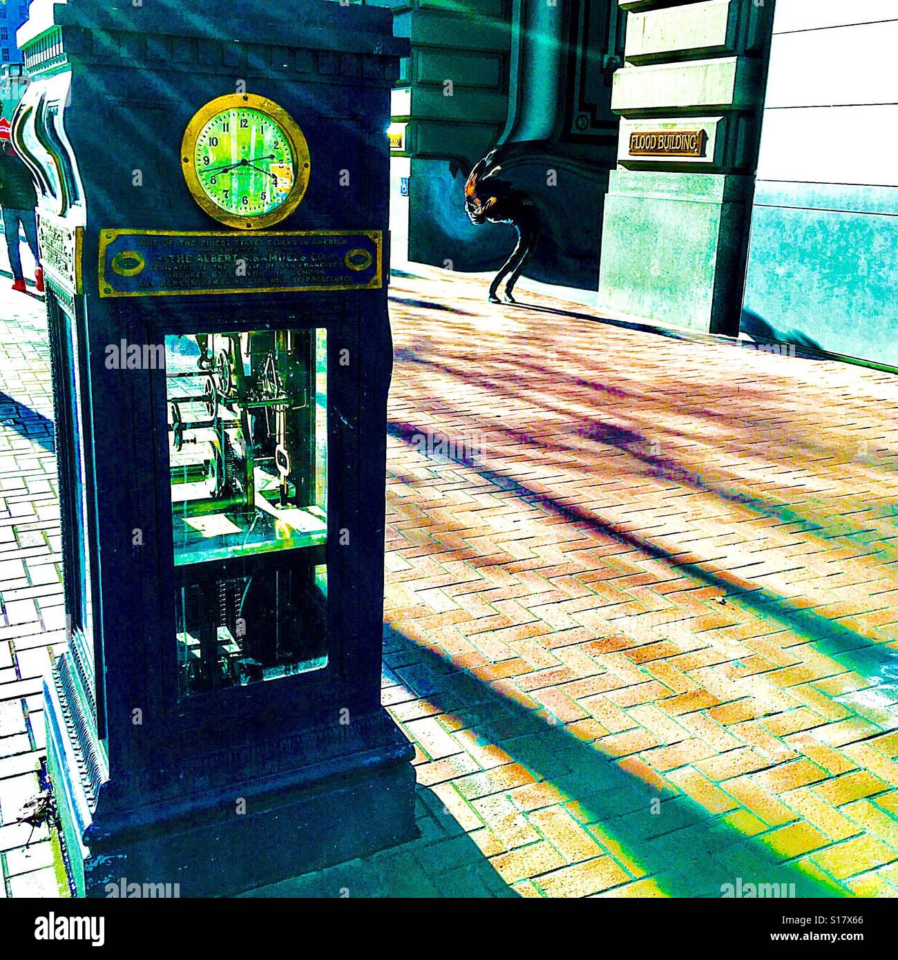 The clock & the alien 2 Stock Photo - Alamy