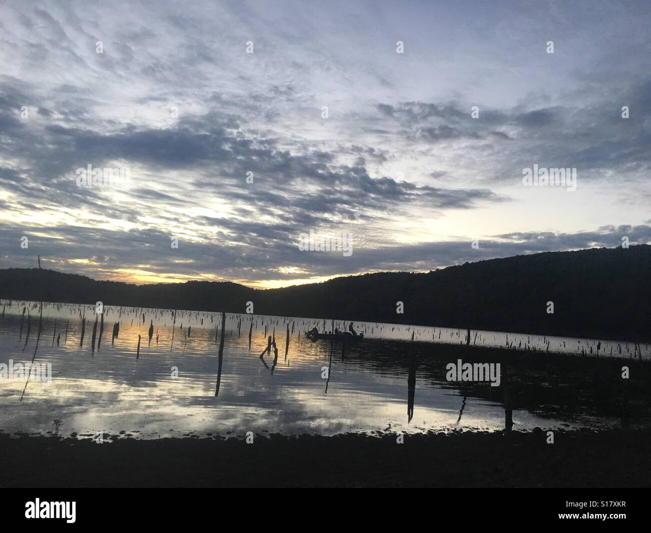 Sunset by the lake Stock Photo - Alamy