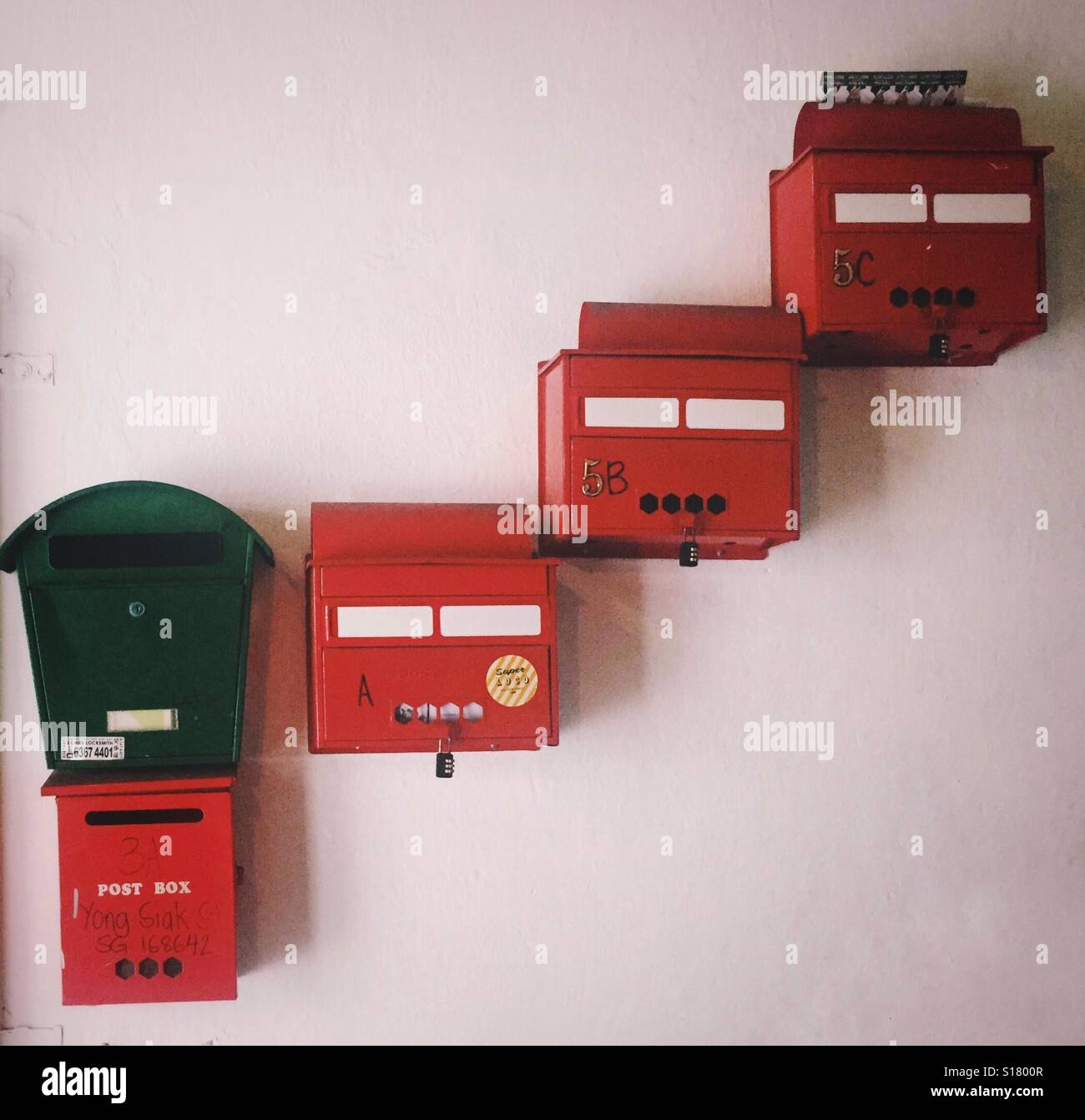 Four 4 letterboxes hi-res stock photography and images - Alamy