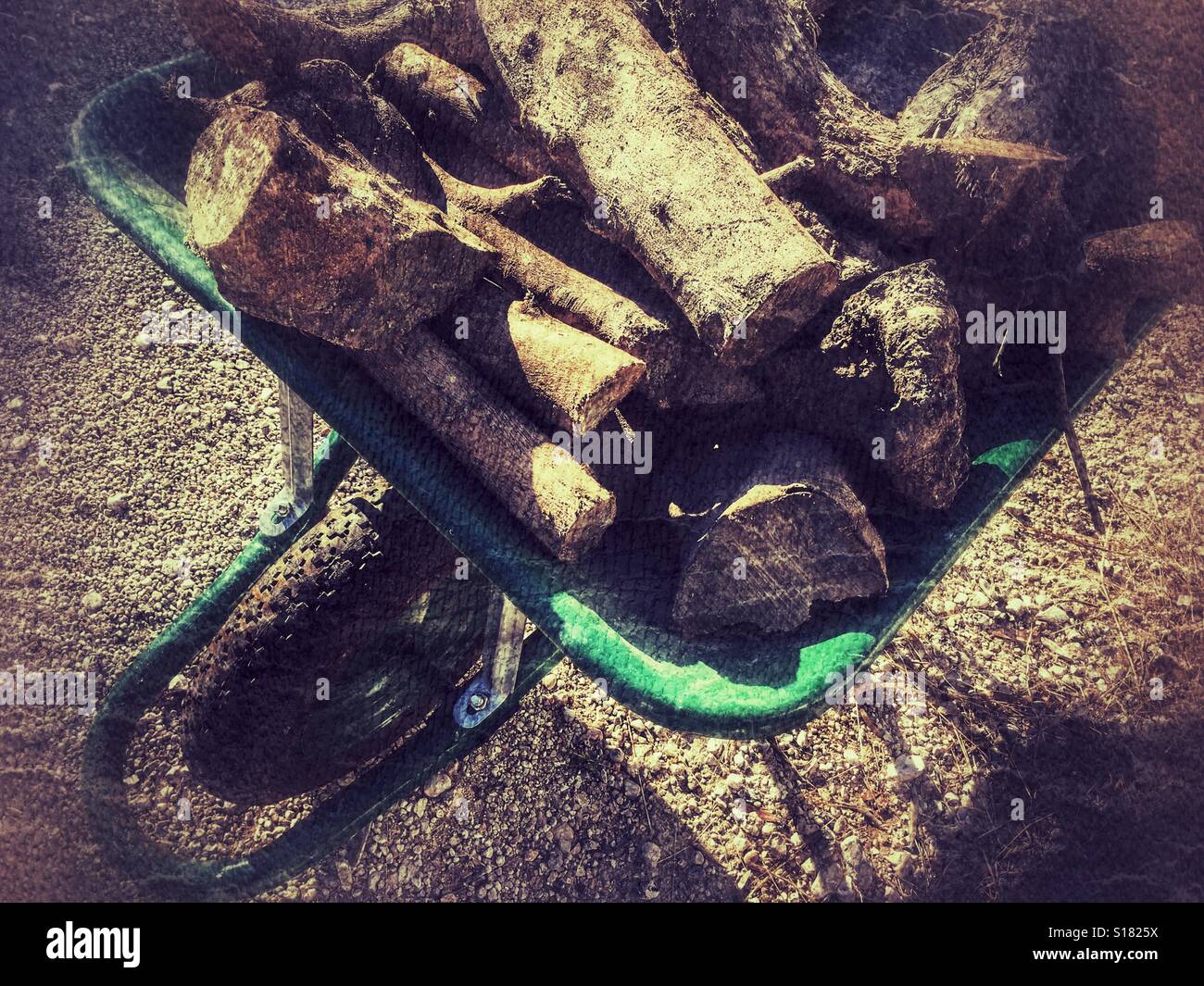Log wheelbarrow wood hi-res stock photography and images - Alamy