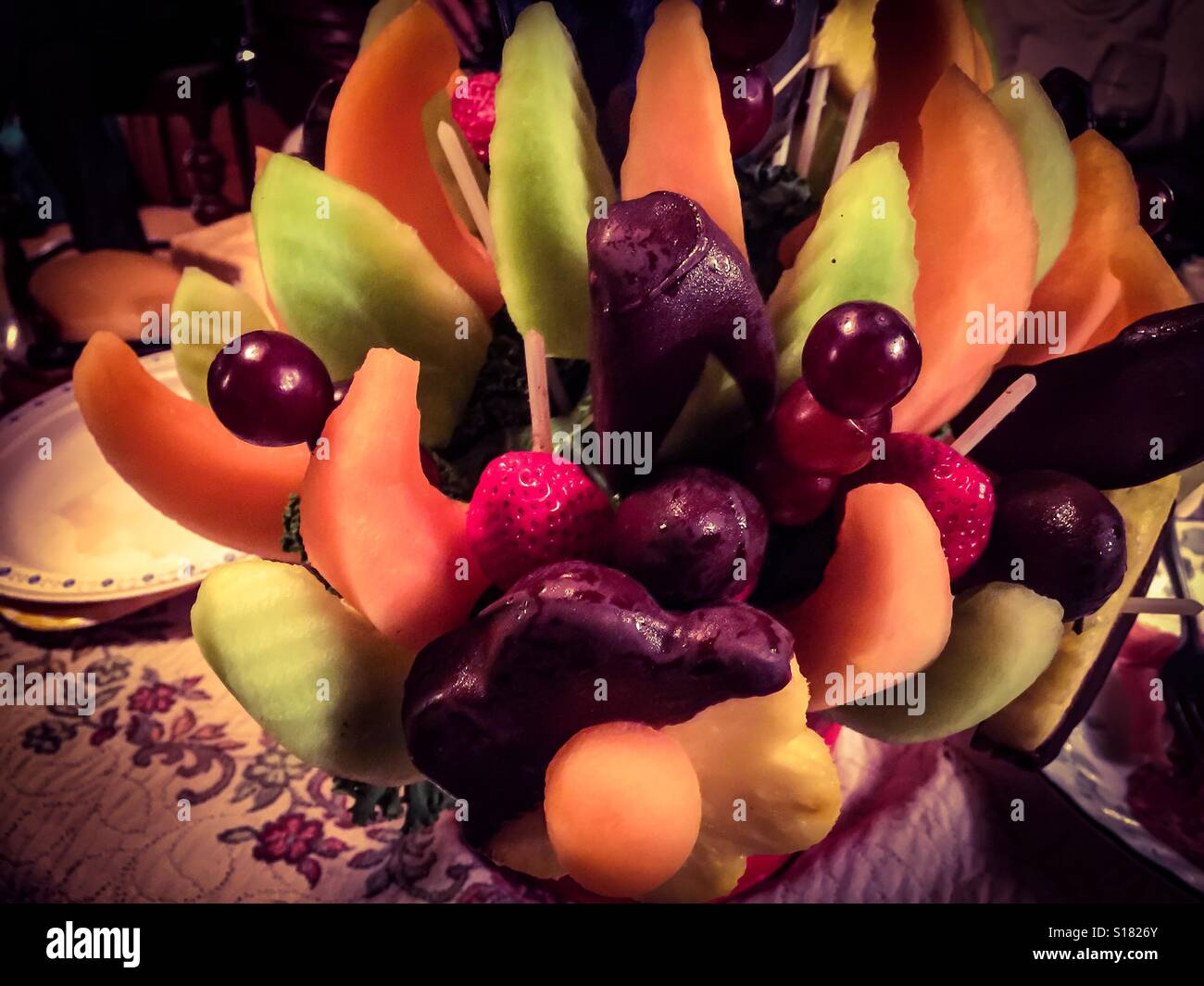 Fresh fruit coated in chocolate Stock Photo - Alamy