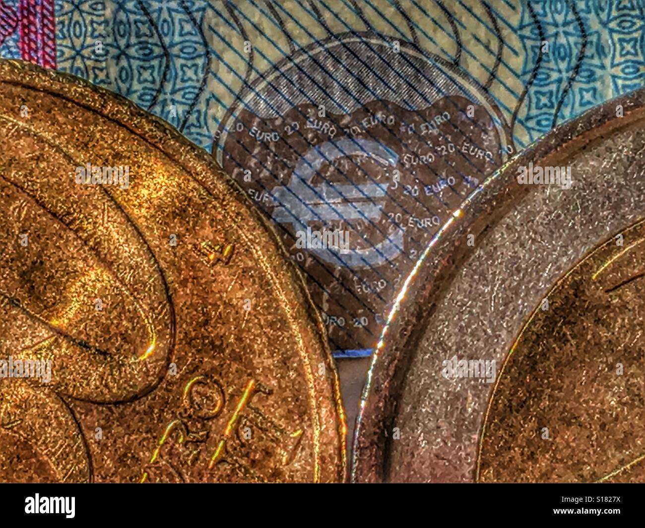 Macro. € symbol on a 5€ note, with a 50 cents and €2 coin Stock Photo ...
