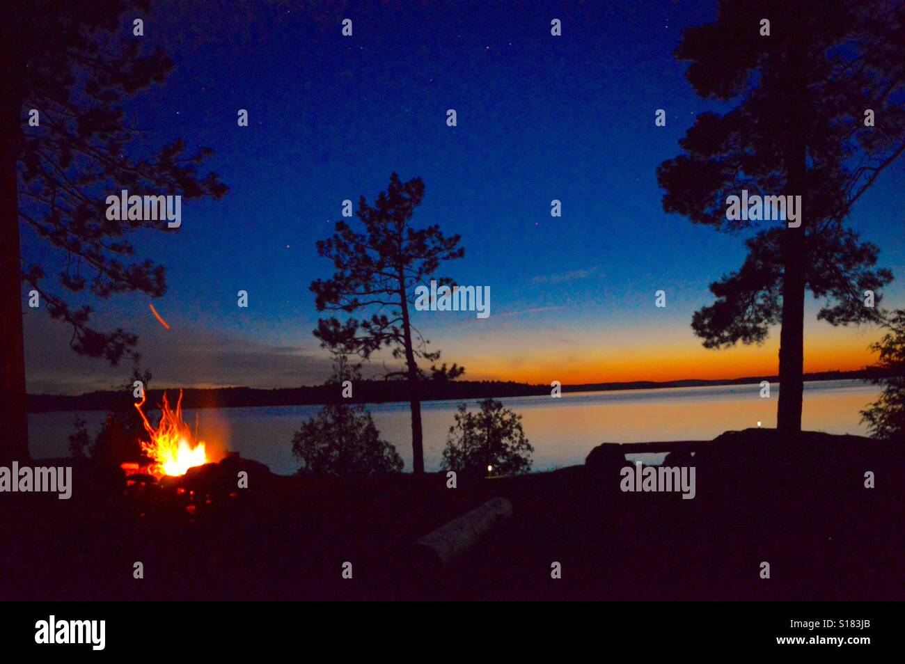 Campfire With Solar Lights By Lakeshore Stock Photo - Alamy