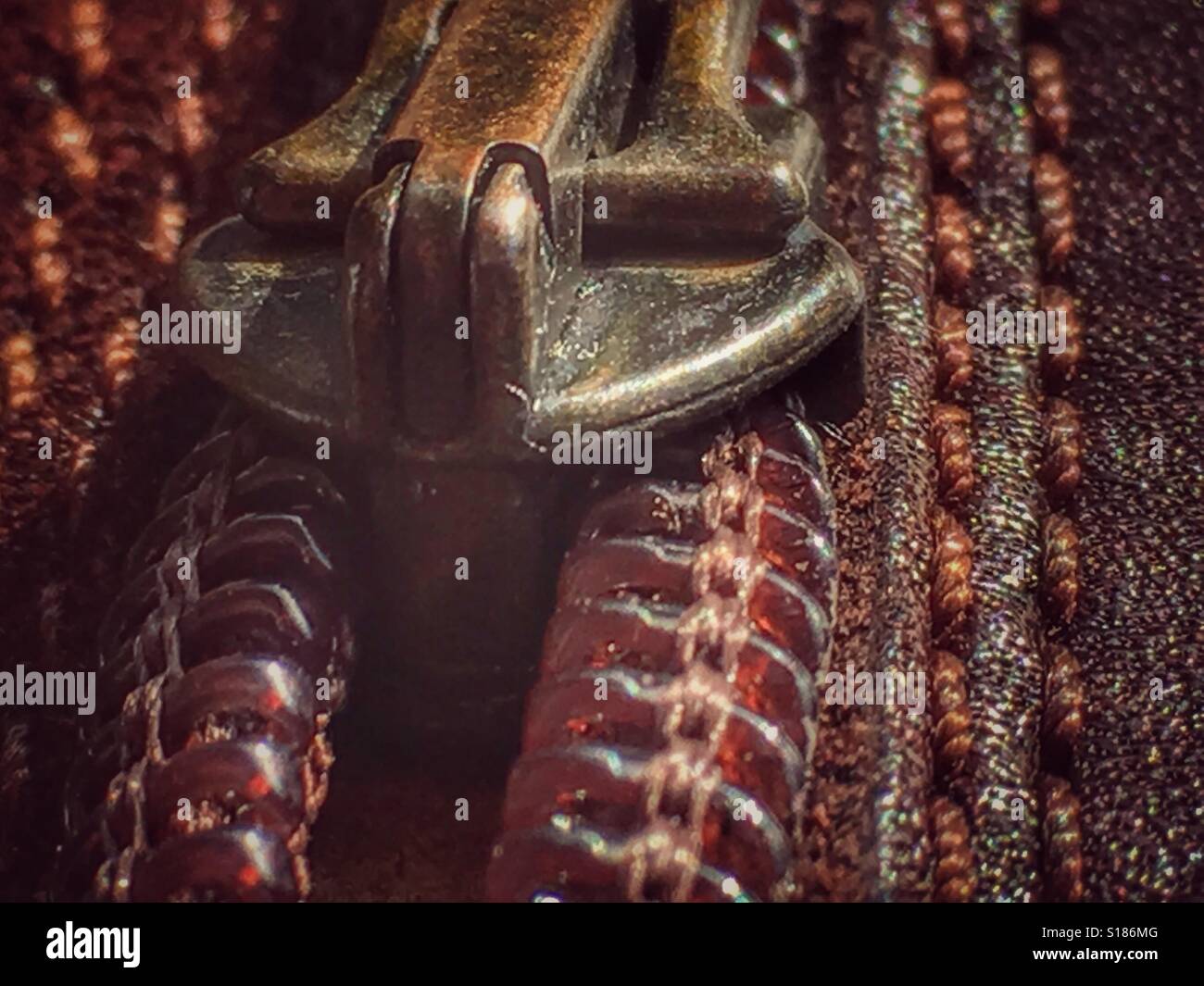 Teeth of a zip hi-res stock photography and images - Alamy