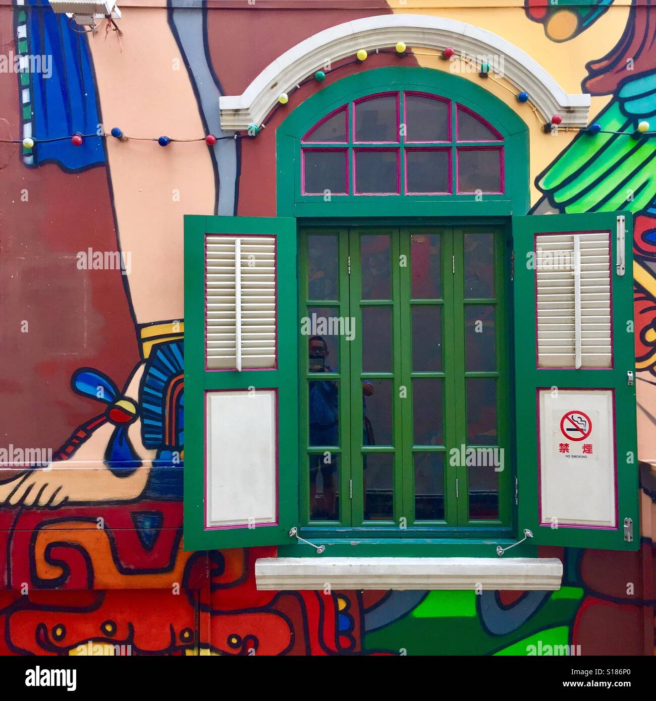 Vintage window and mural art on the wall , Haji Lane, Singapore Stock ...