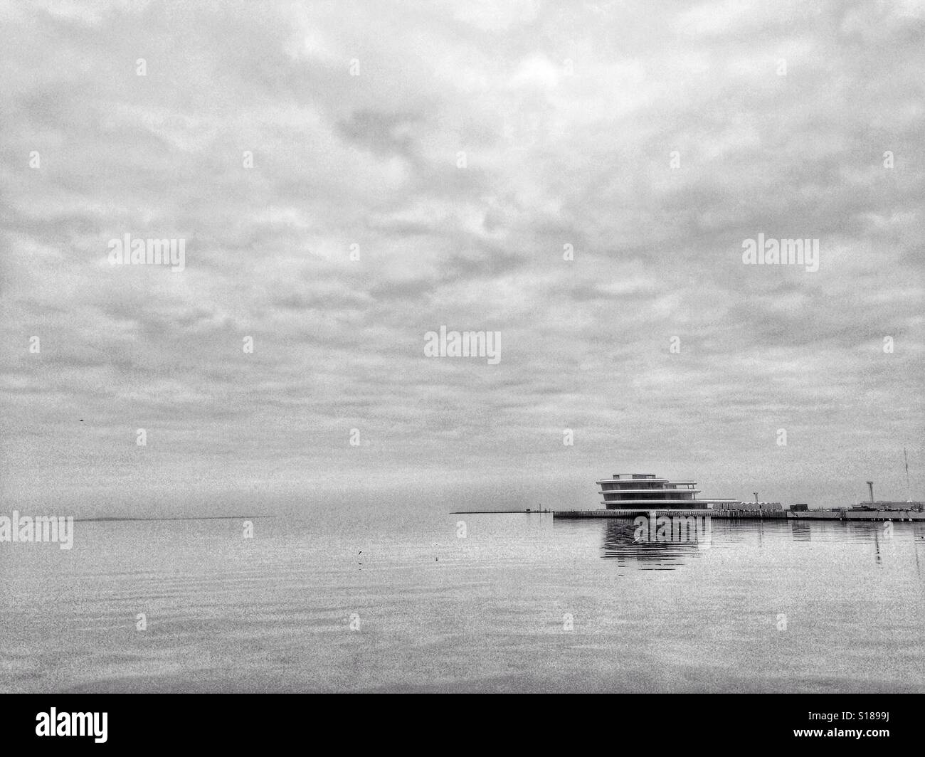 Building in a water, minimal background Stock Photo - Alamy