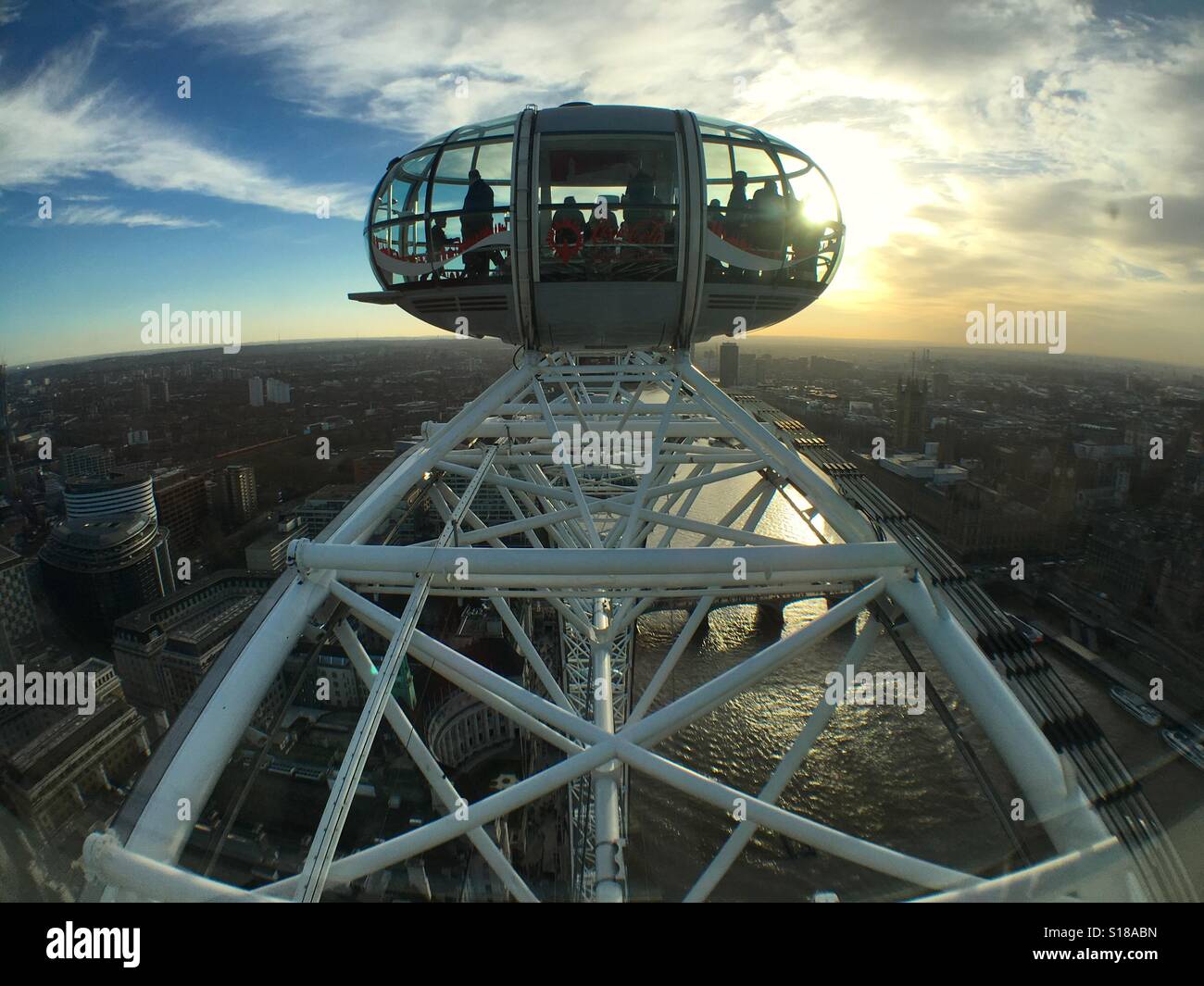 London Eye capsule and its supporting structure against the sunset ...