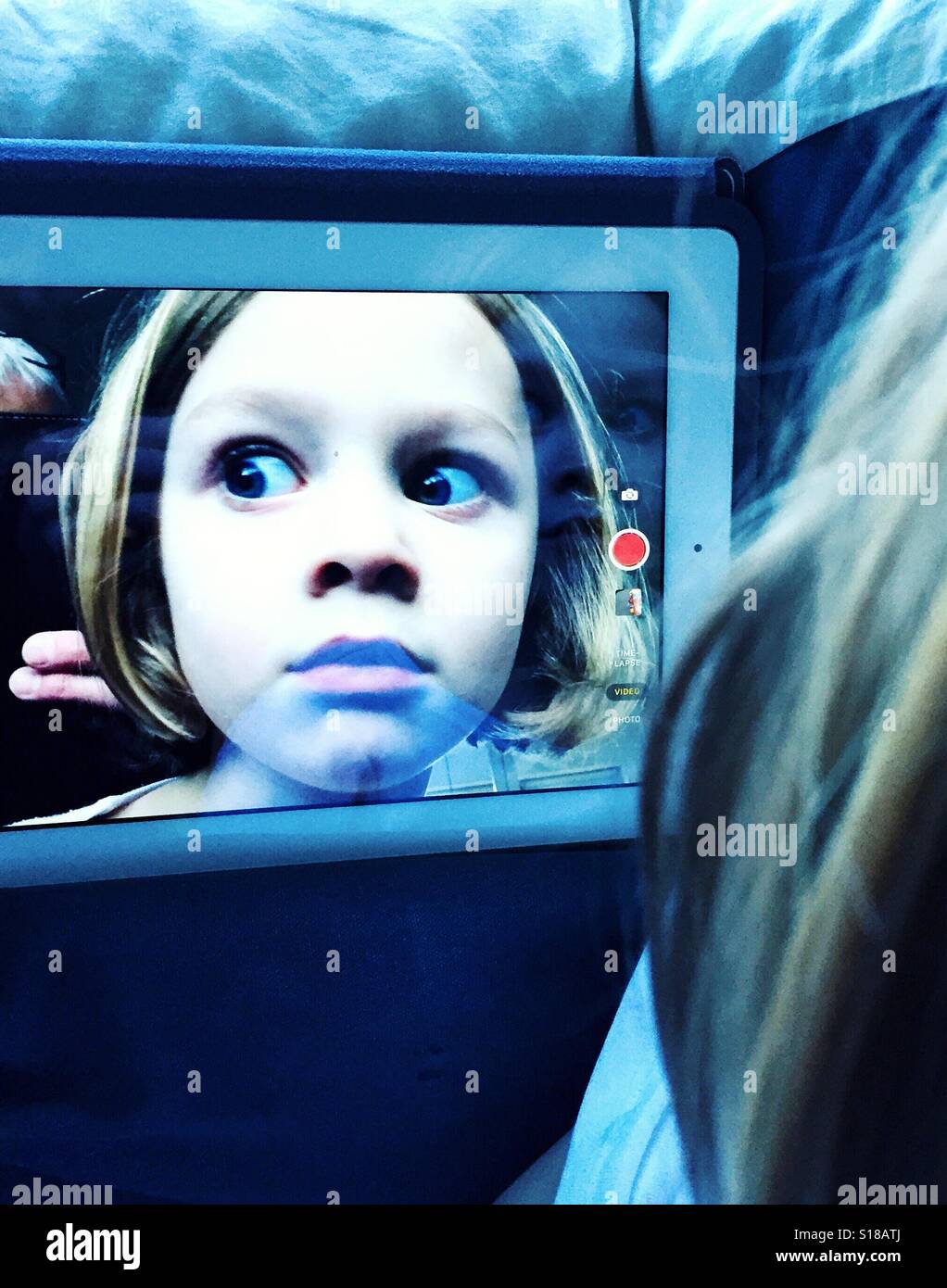 Ipad with face hi-res stock photography and images - Alamy