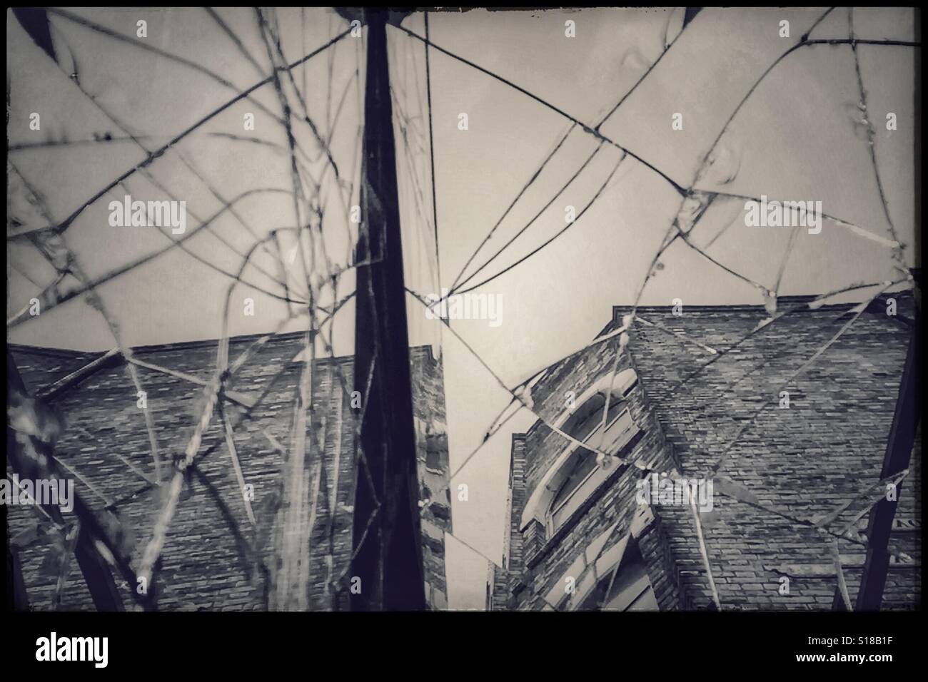 Buildings reflected in broken mirrors Stock Photo - Alamy