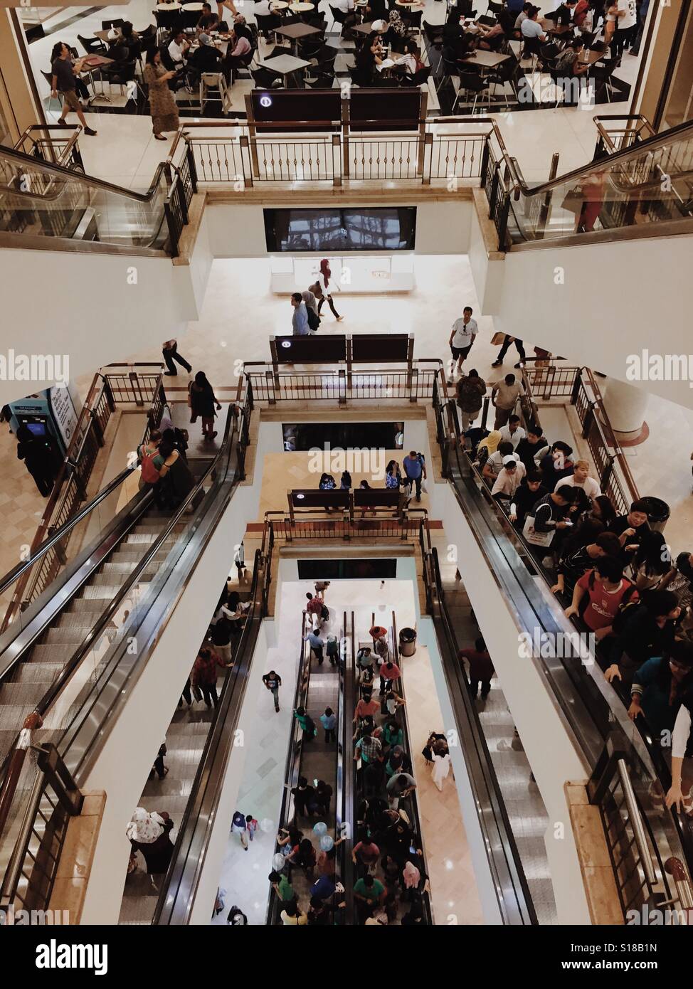 Crowd at shopping mall Stock Photo - Alamy