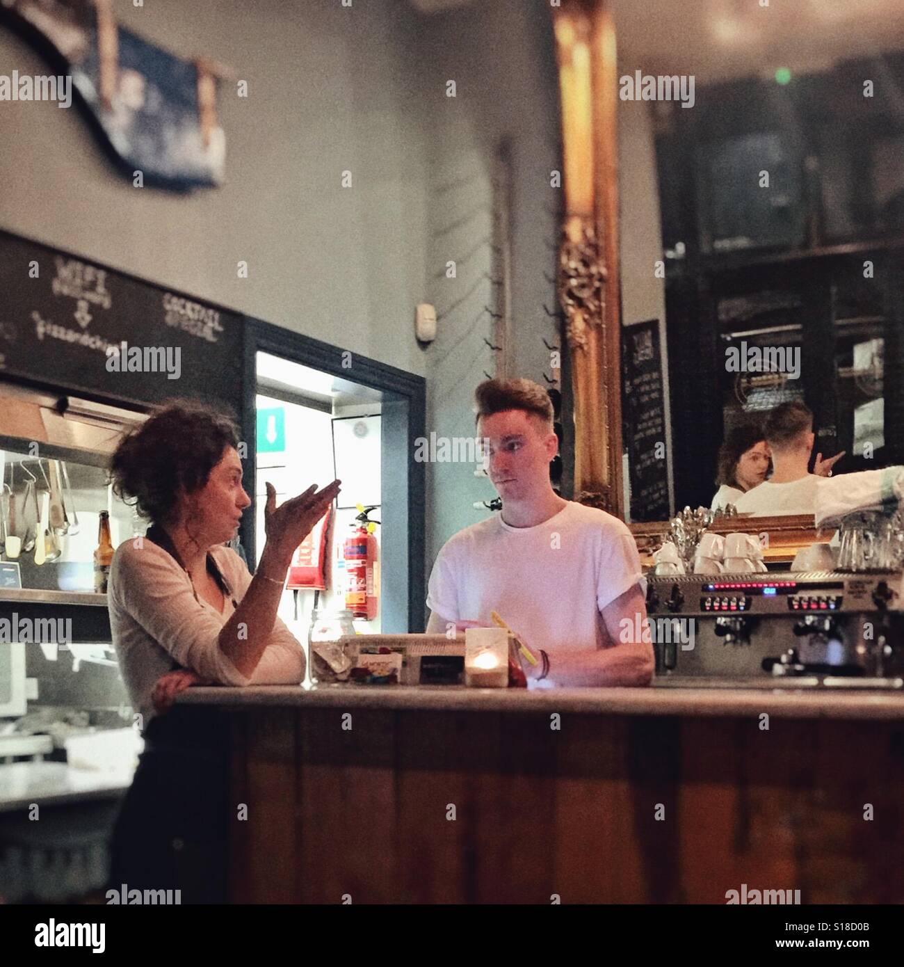 Bartender talk hi-res stock photography and images - Alamy