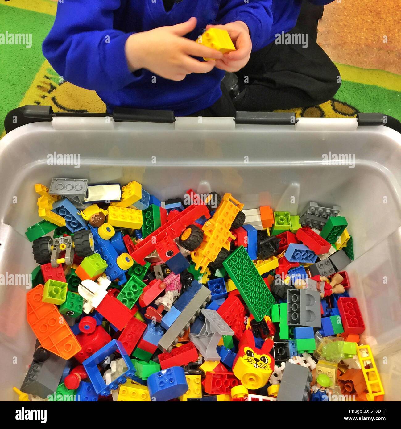 Little girl playing with lego hi-res stock photography and images - Alamy