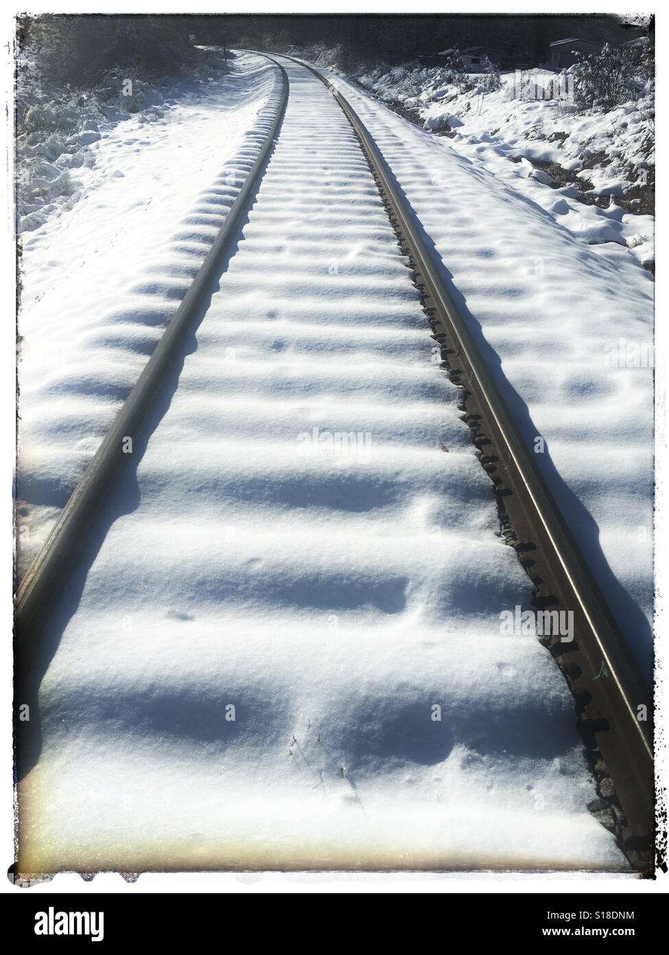 Snow covered railroad tracks hi-res stock photography and images - Alamy