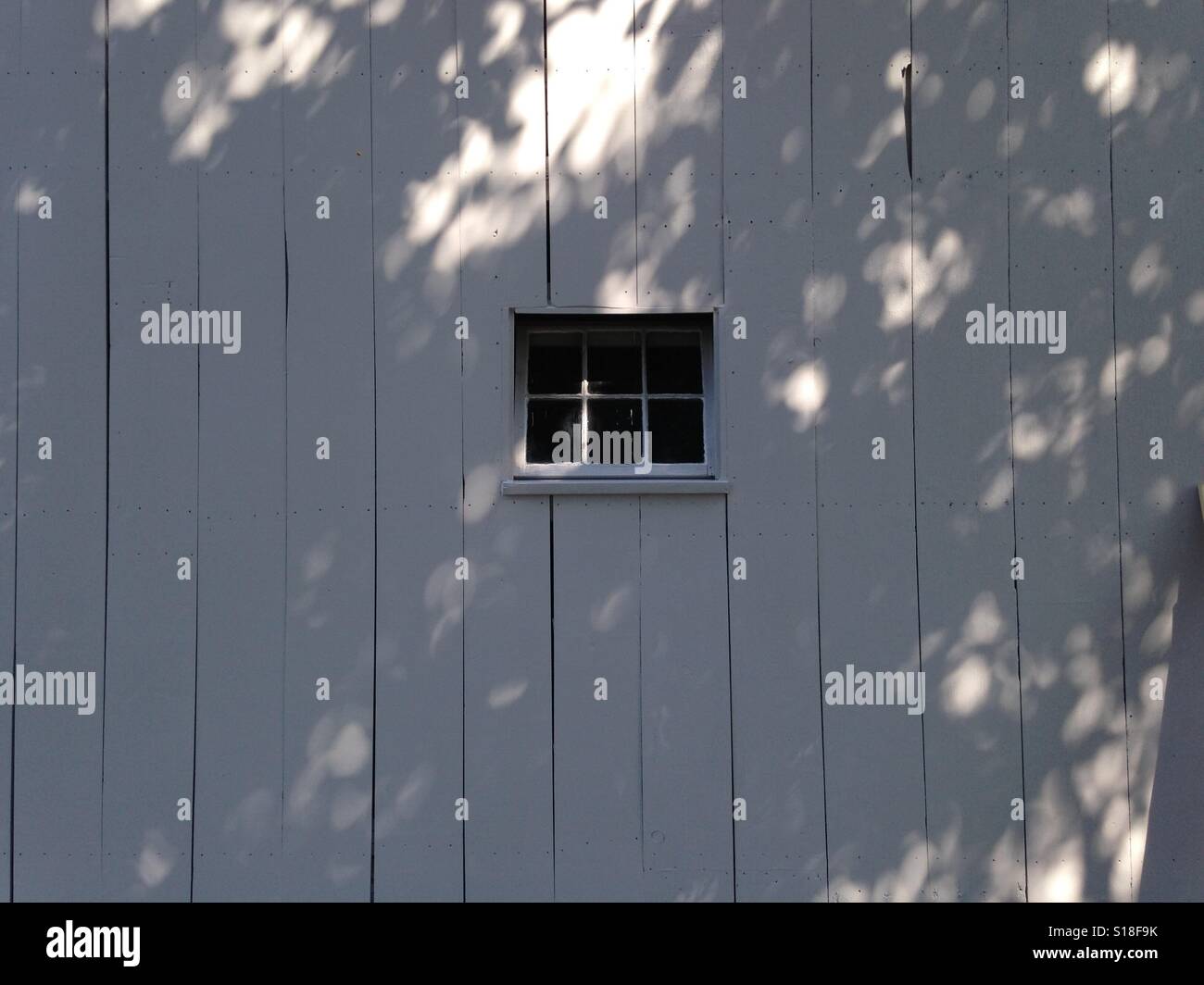 Grey wall with window hi-res stock photography and images - Alamy