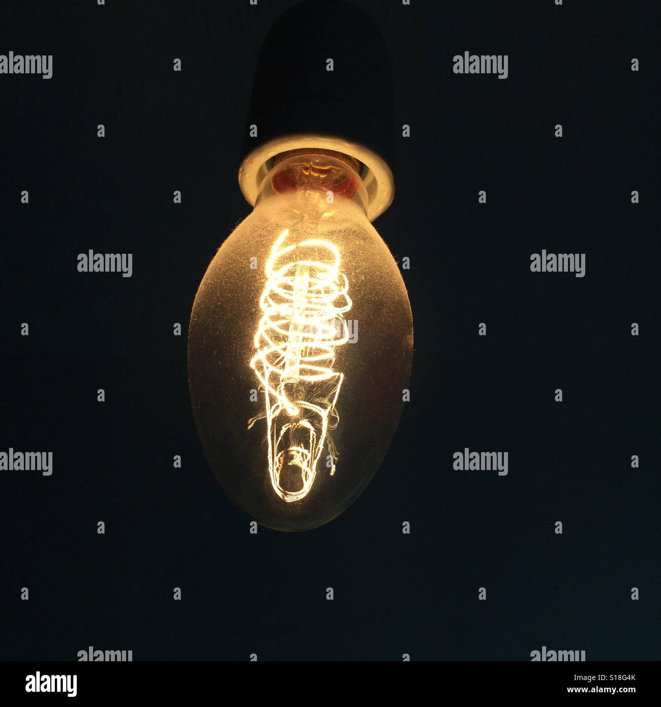 Vintage style filament light bulb Stock Photo - Alamy