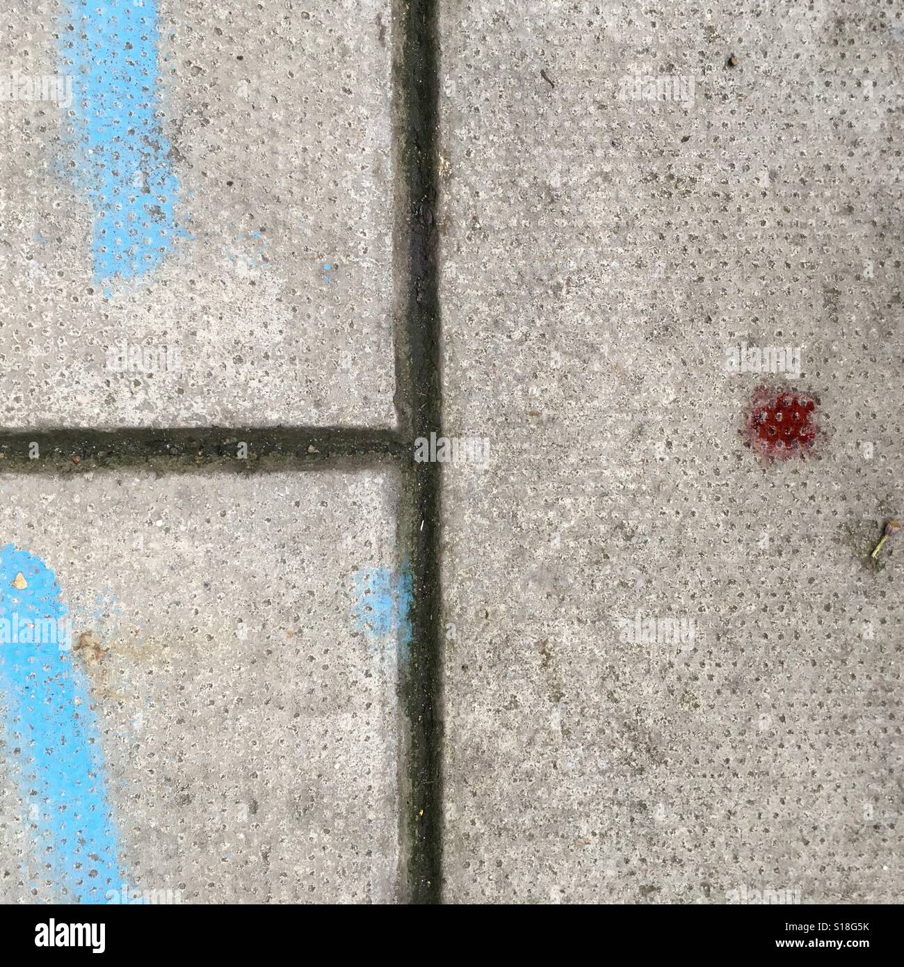 Drop of blood on pavement Stock Photo - Alamy