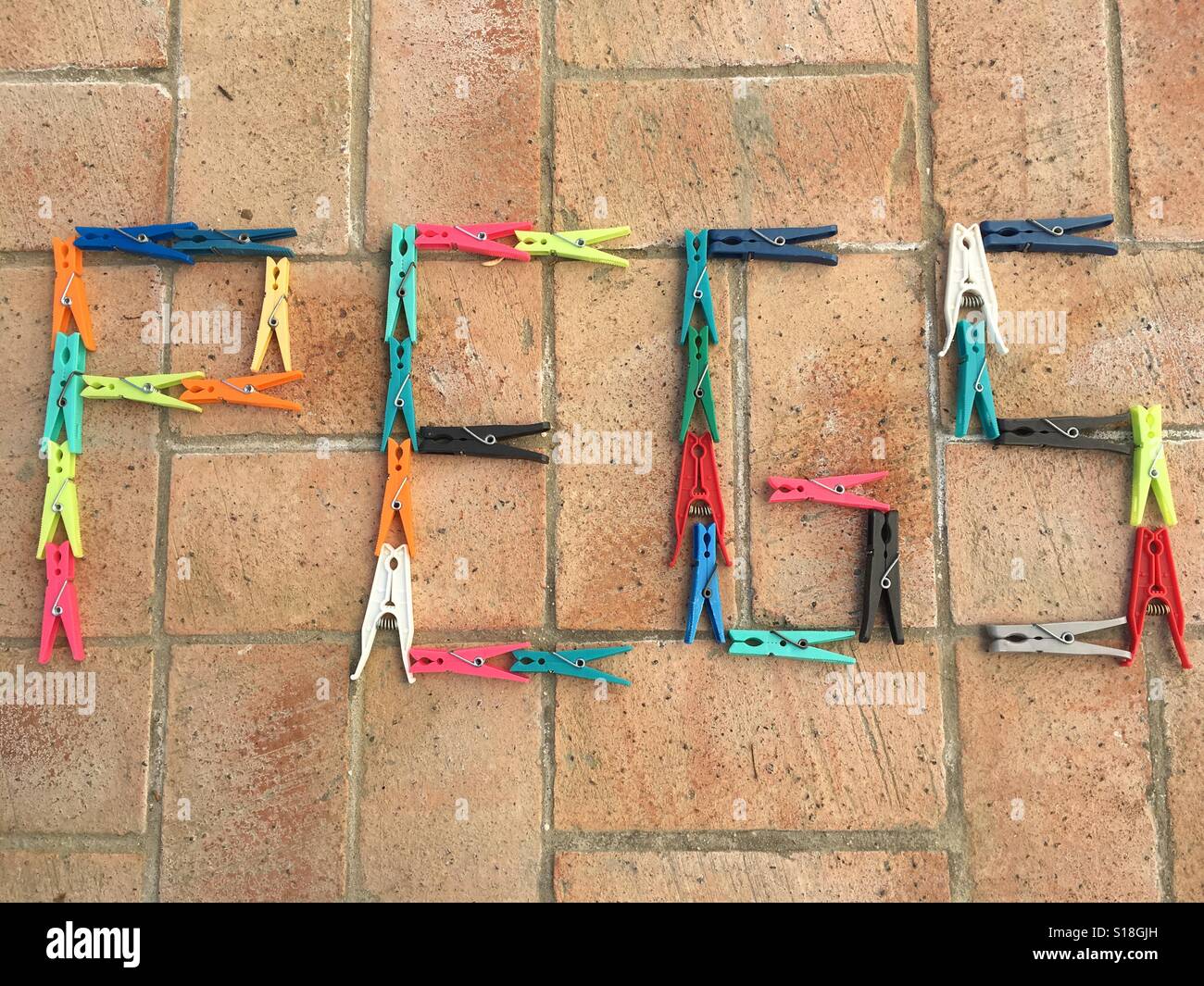 Label using pegs Stock Photo - Alamy