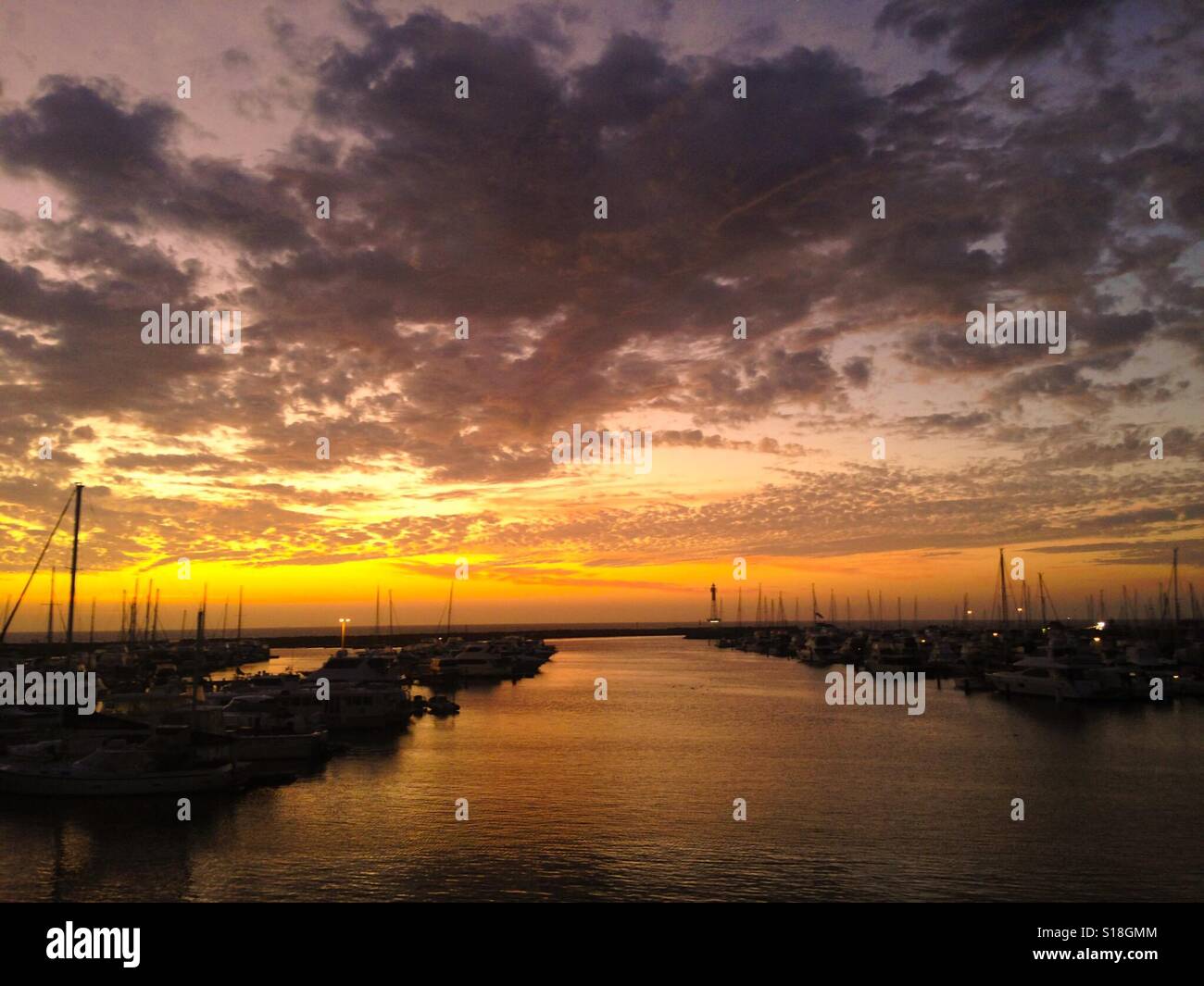 Sunset at a pier in Perth Stock Photo - Alamy