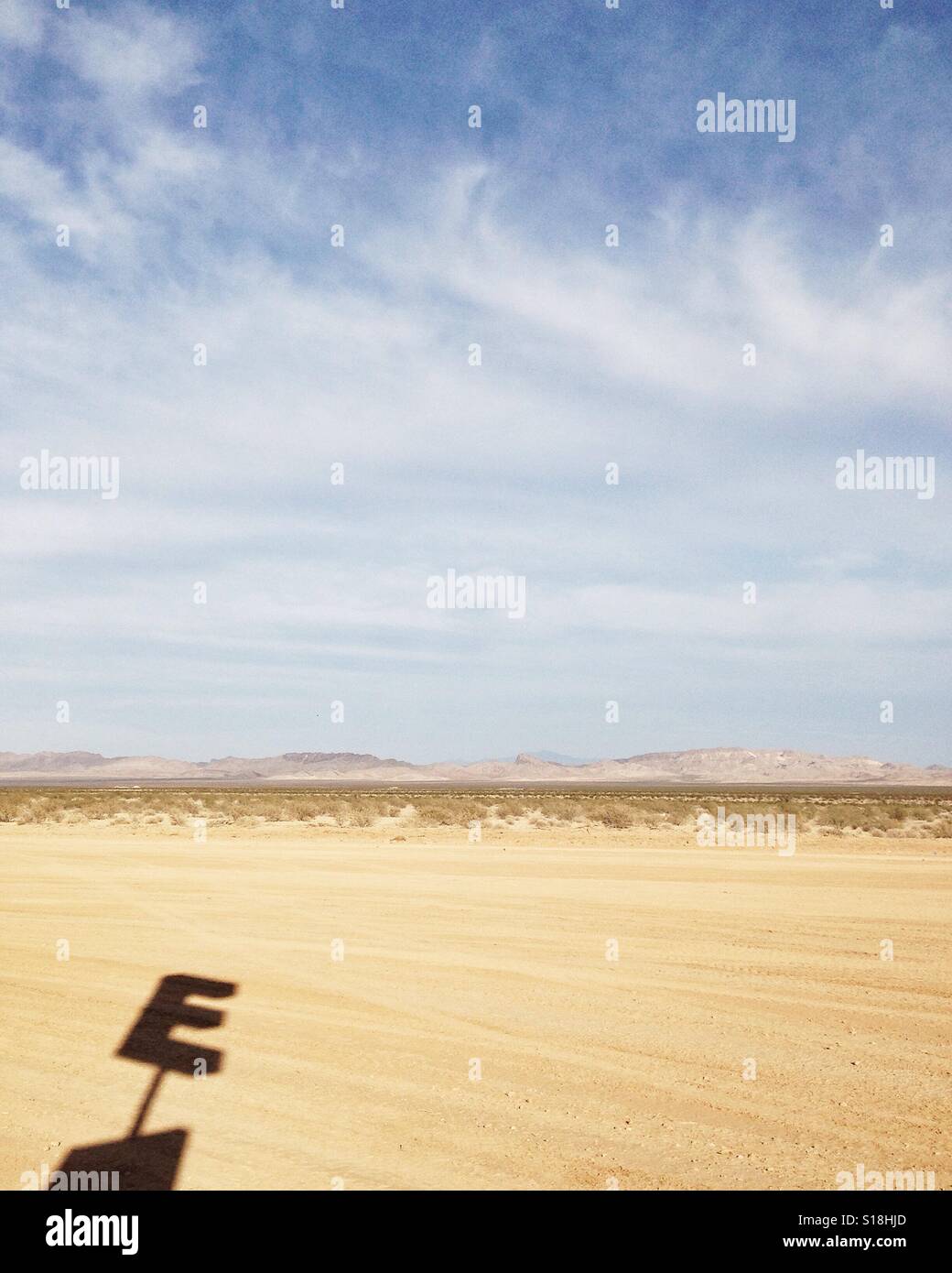E shadow in the desert Stock Photo - Alamy