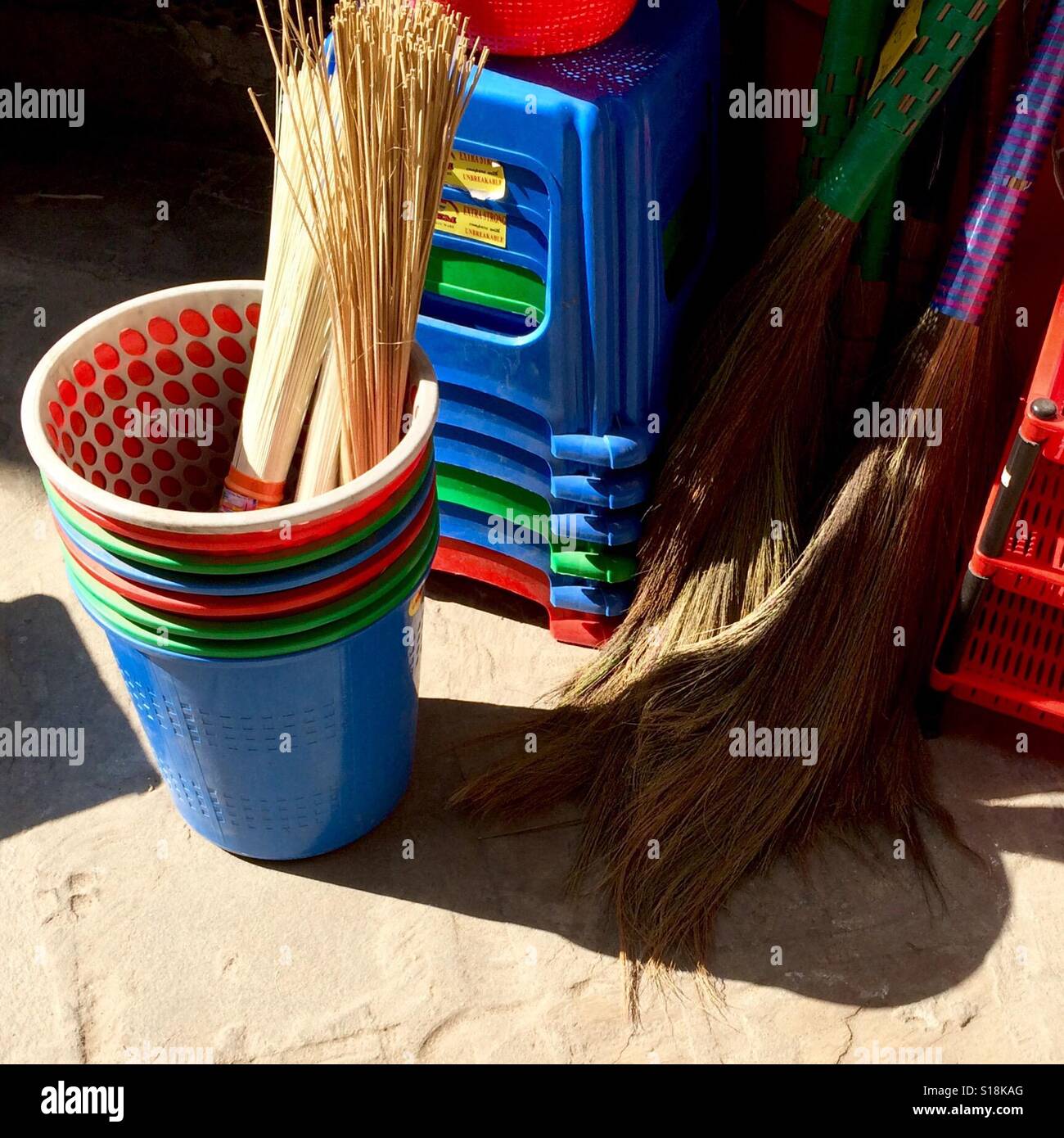 Plastic buckets and brooms, Kathmandu Stock Photo - Alamy