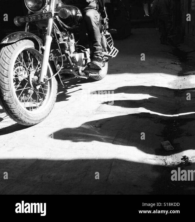 Motorbike and shadows Stock Photo - Alamy