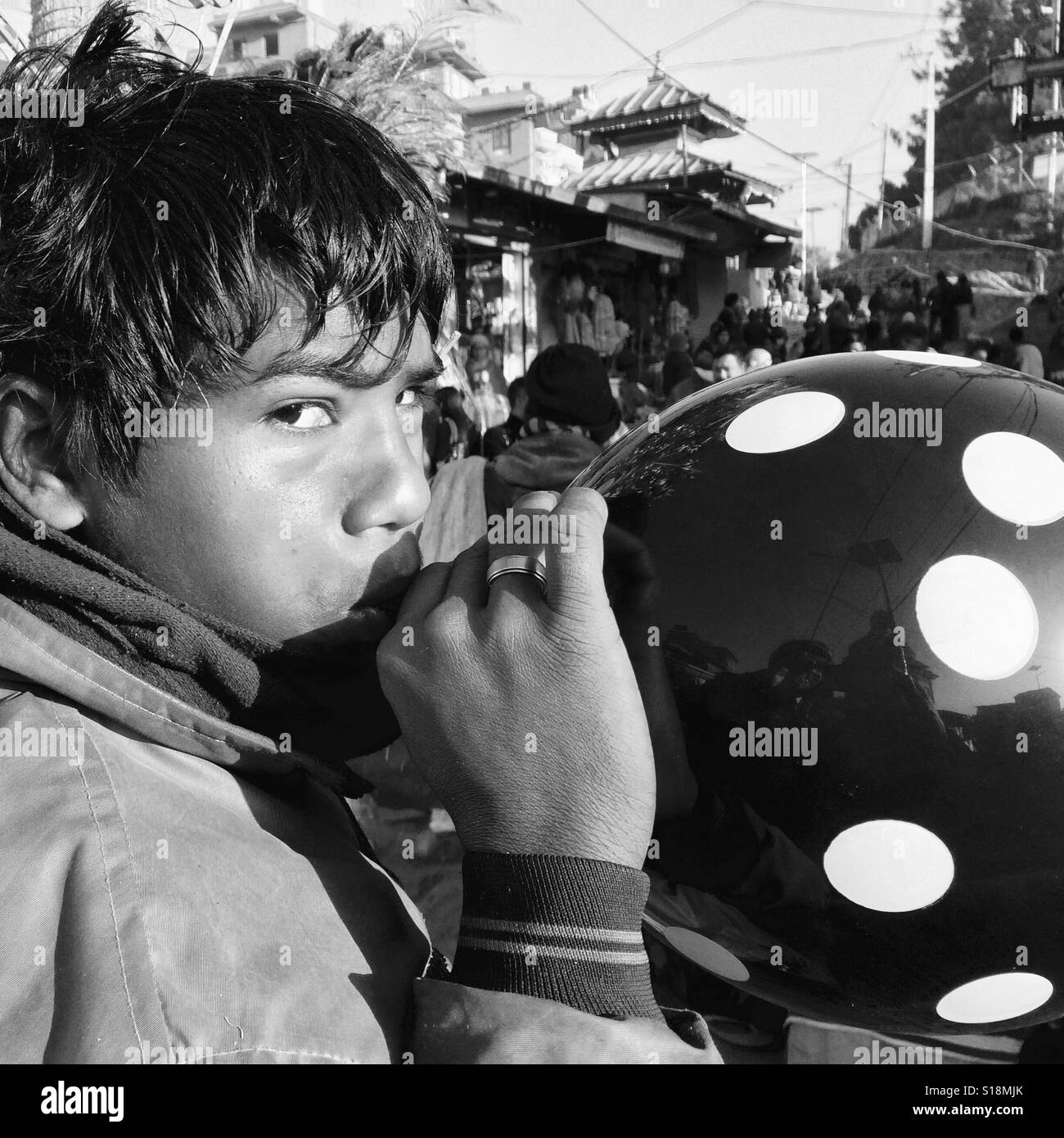 Blowing balloon Black and White Stock Photos & Images - Alamy
