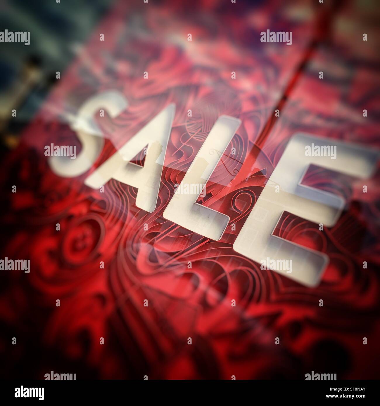 Sale sign in shop store window Stock Photo - Alamy