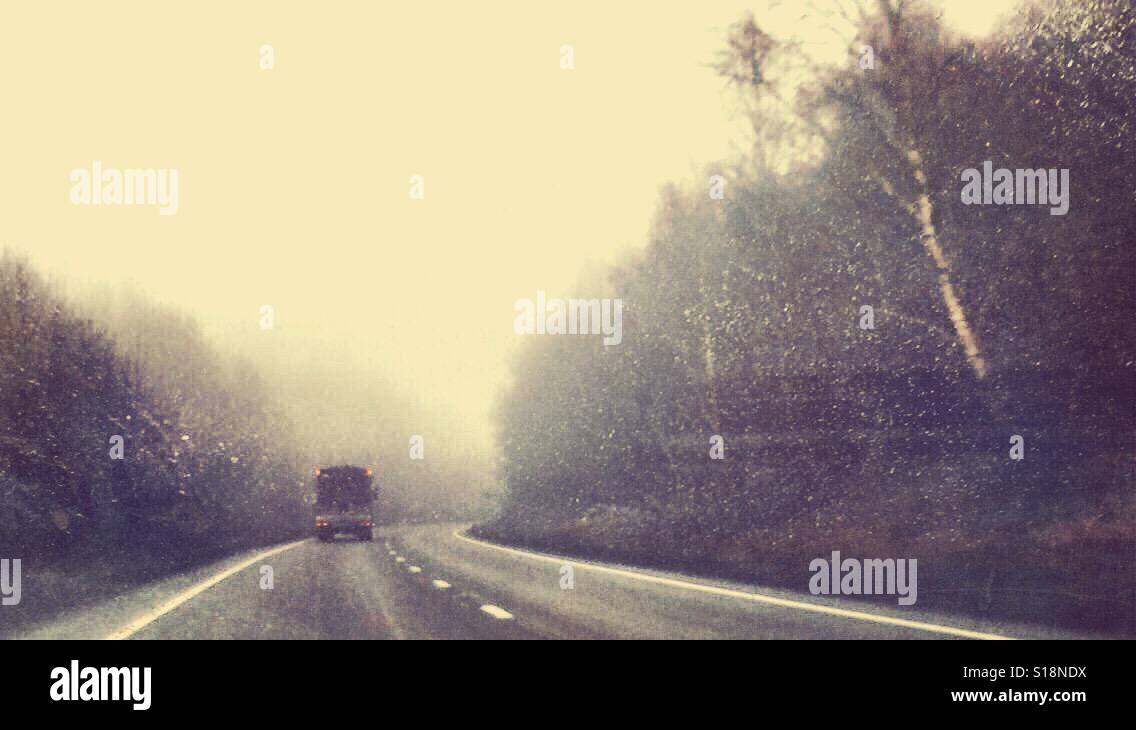 Driving along a quiet road Stock Photo - Alamy