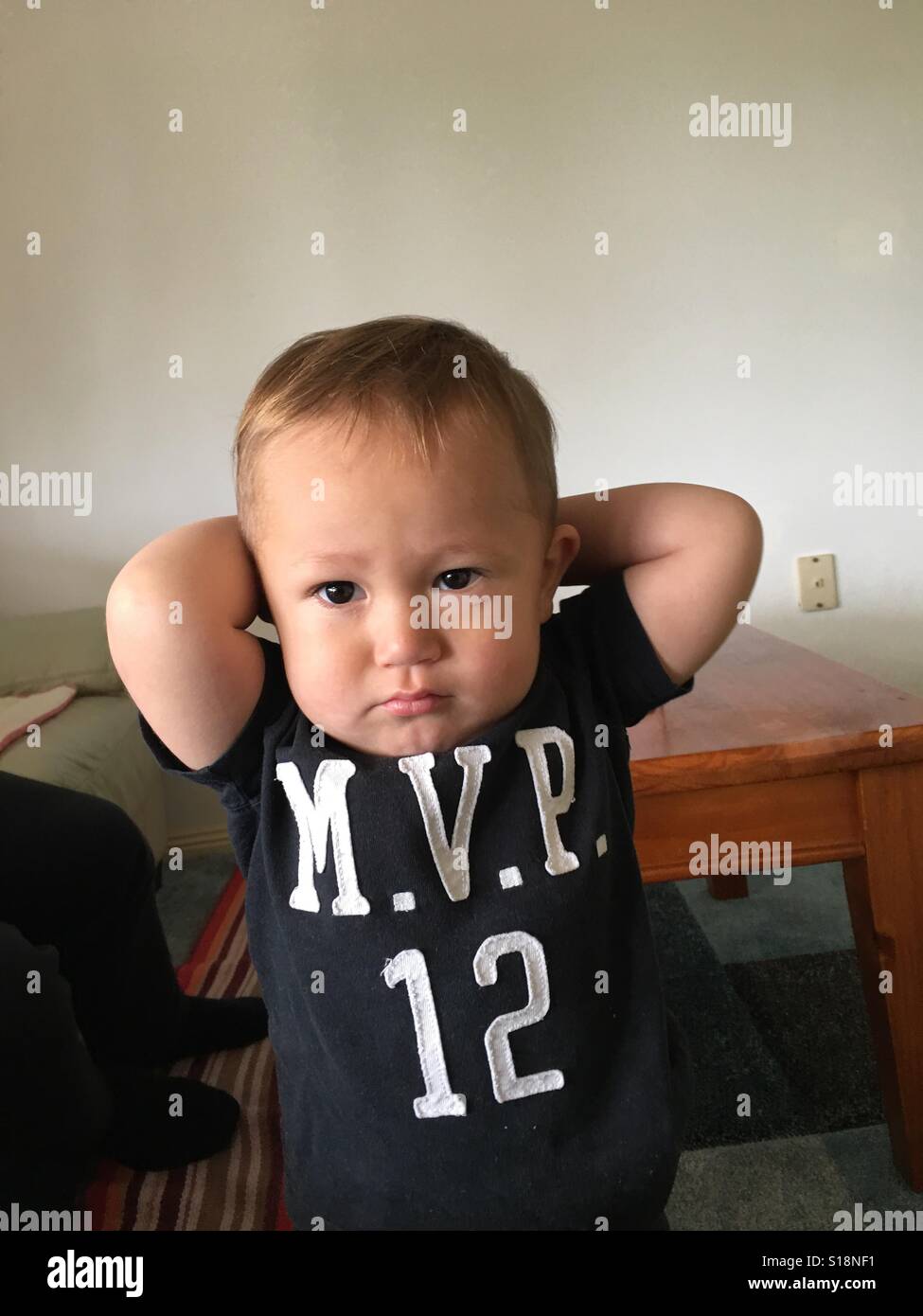 Strong muscles and child hi-res stock photography and images - Alamy