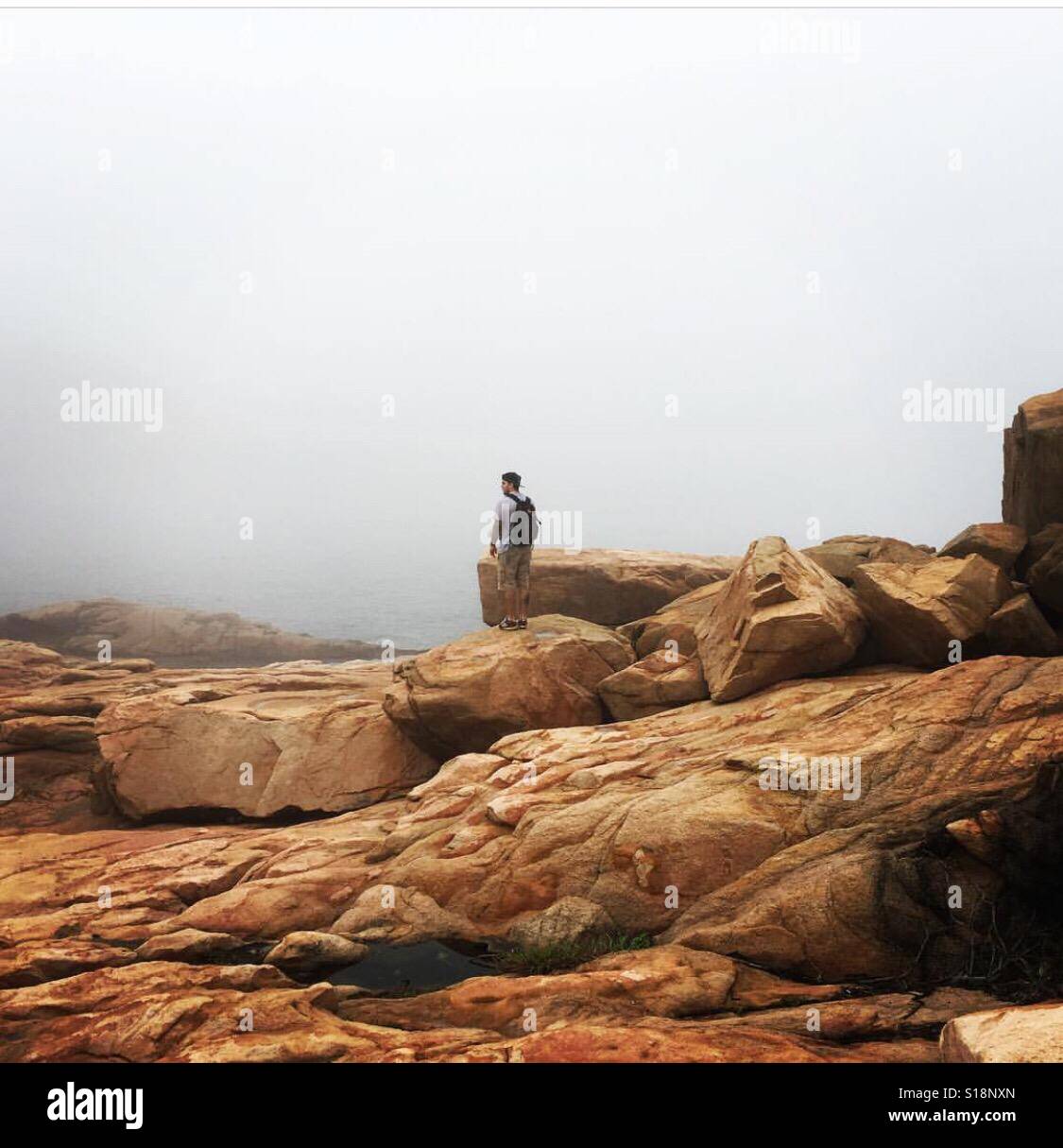 Man in the mist Stock Photo - Alamy