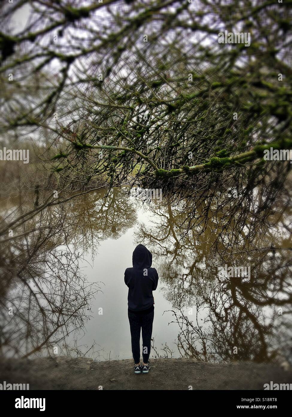 Person looking over water hi-res stock photography and images - Alamy