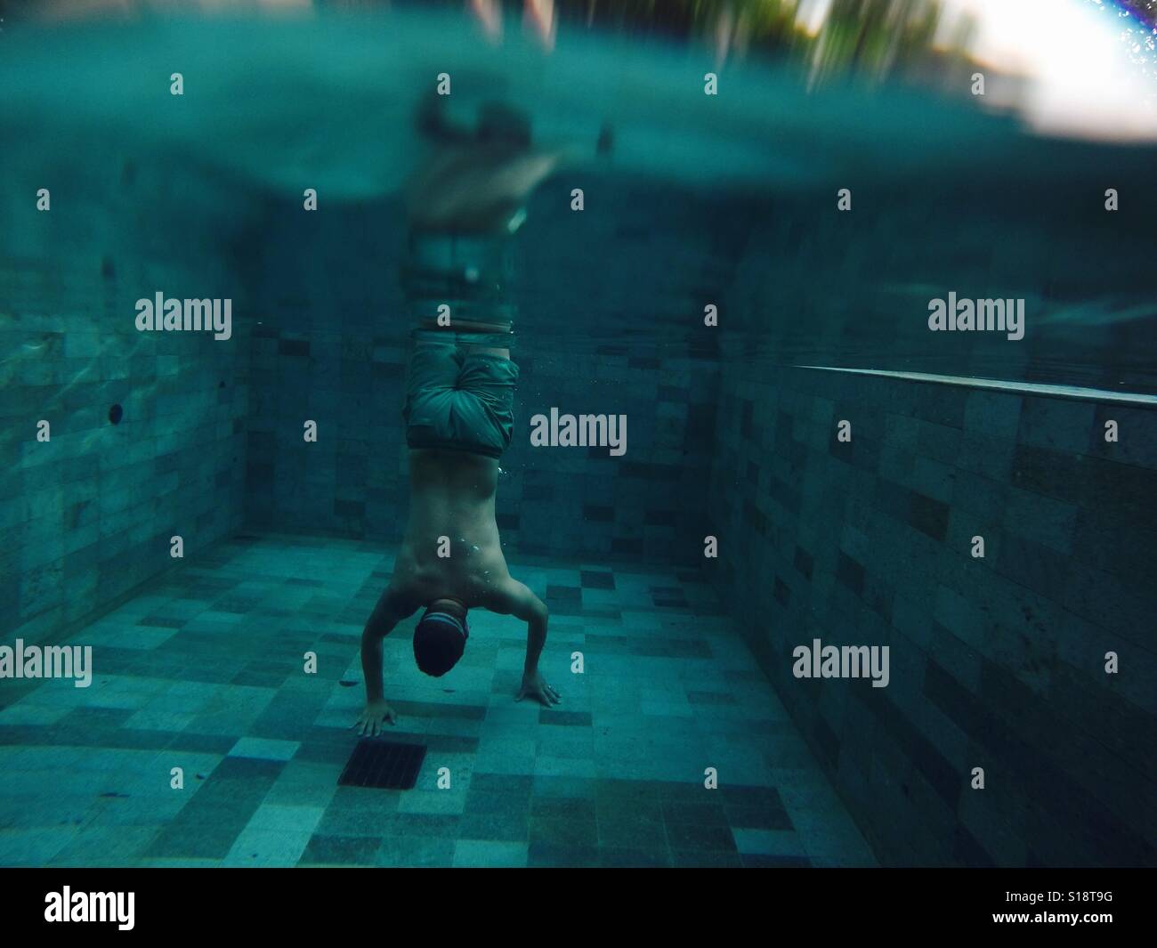 Underwater pool handstand hi-res stock photography and images - Alamy