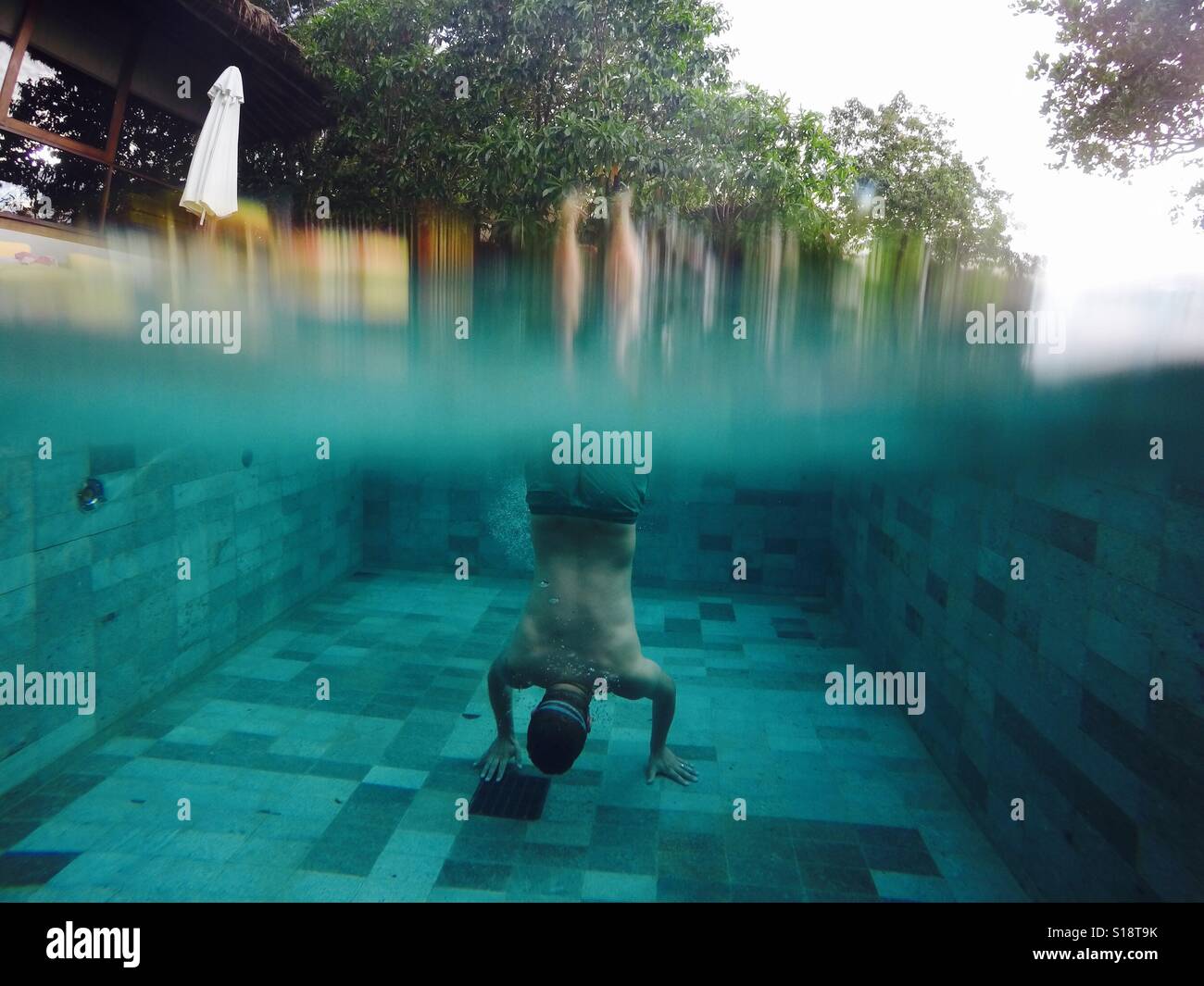 Underwater pool handstand hi-res stock photography and images - Alamy