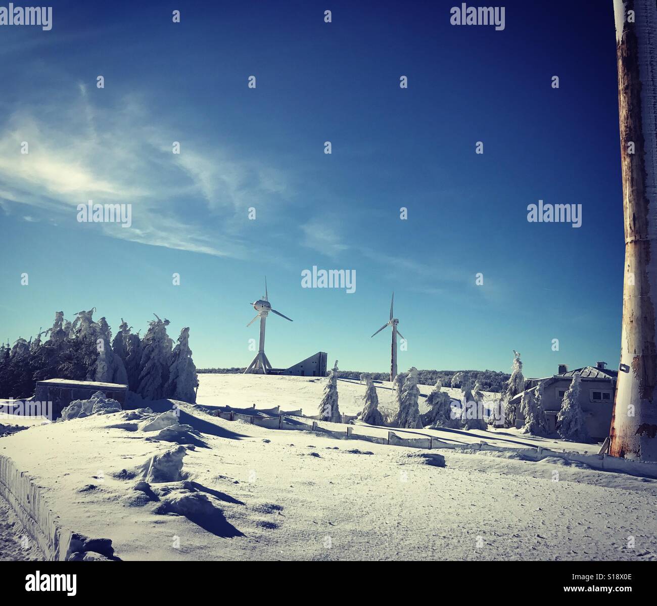 Winter landscape. Rusty windmills and Snow covered trees in Winter ...