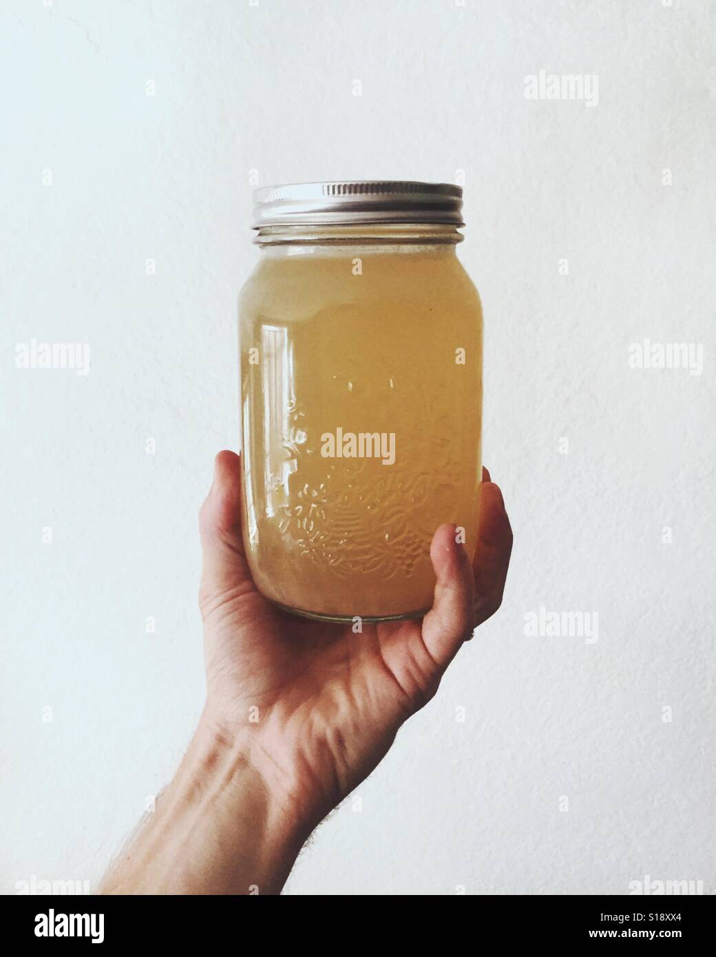 Chicken bone broth hi-res stock photography and images - Alamy