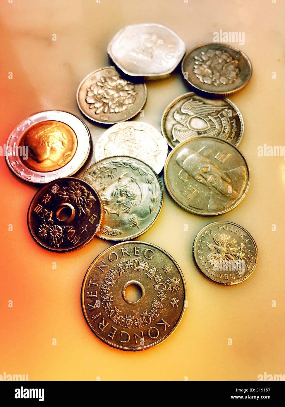 Close up of coins from around the world Stock Photo - Alamy