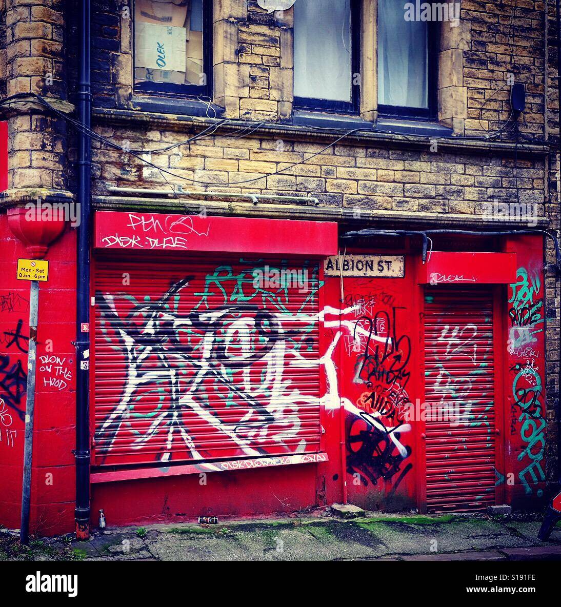 Graffiti on a shopfront in Bradford Stock Photo - Alamy