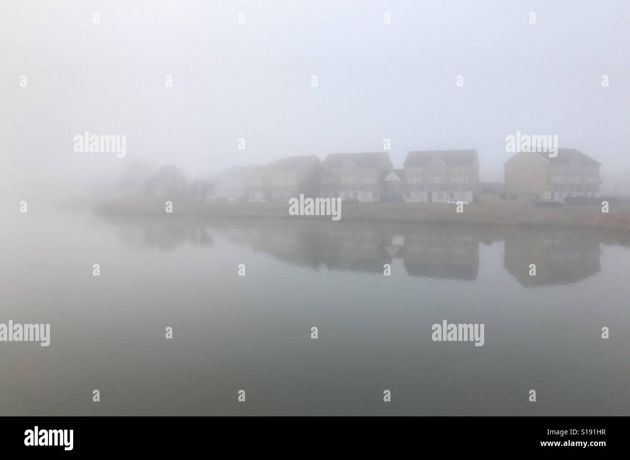 Houses disappearing into thick fog, Peterborough, UK Stock Photo - Alamy
