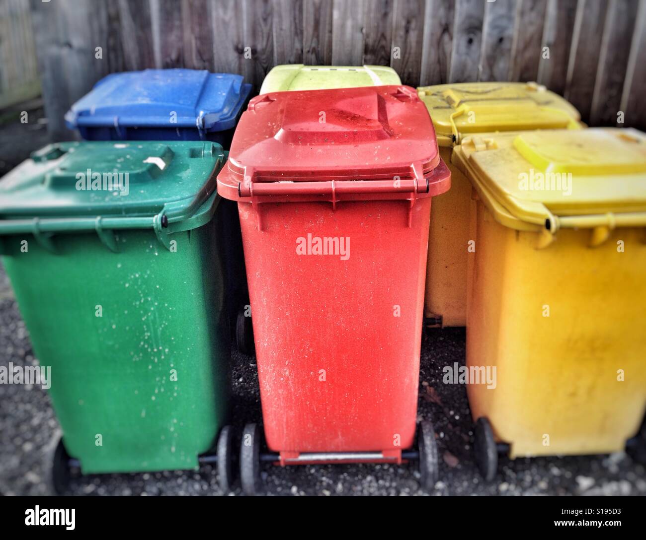 Coloured recycling wheely bins Stock Photo - Alamy