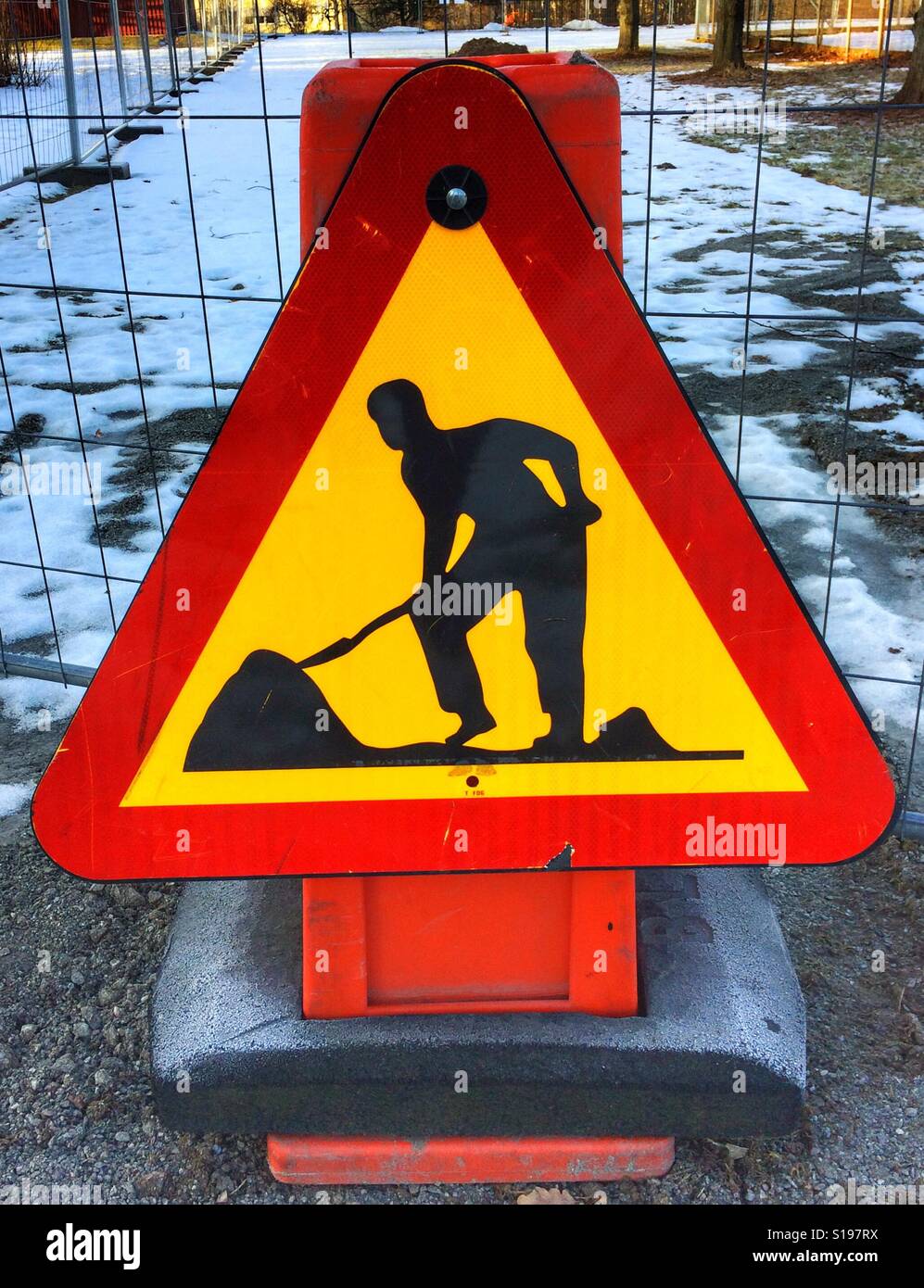 Man digging road work sign hi-res stock photography and images - Alamy