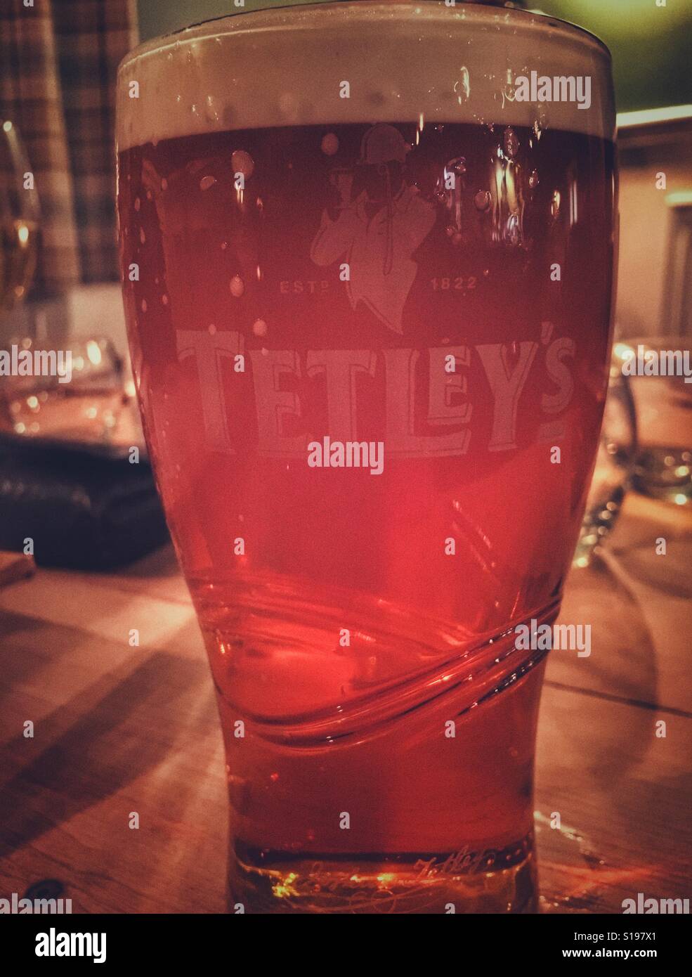 Glass of Tetley's beer Stock Photo - Alamy
