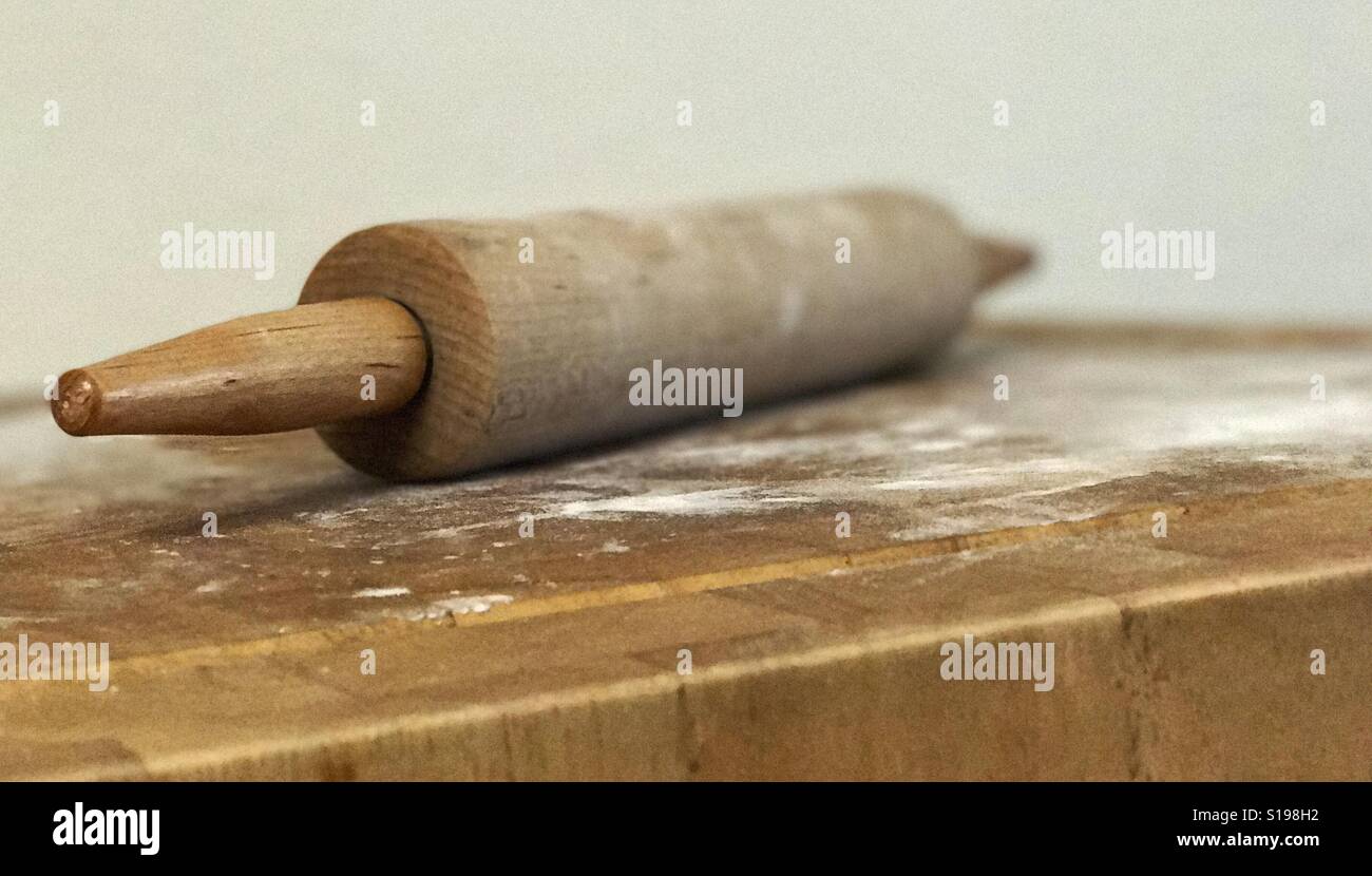 Rolling pin on butcher block with flour Stock Photo - Alamy