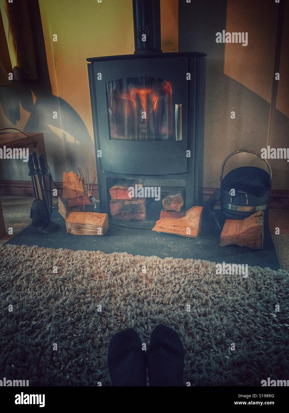 Roaring fire feet hi-res stock photography and images - Alamy