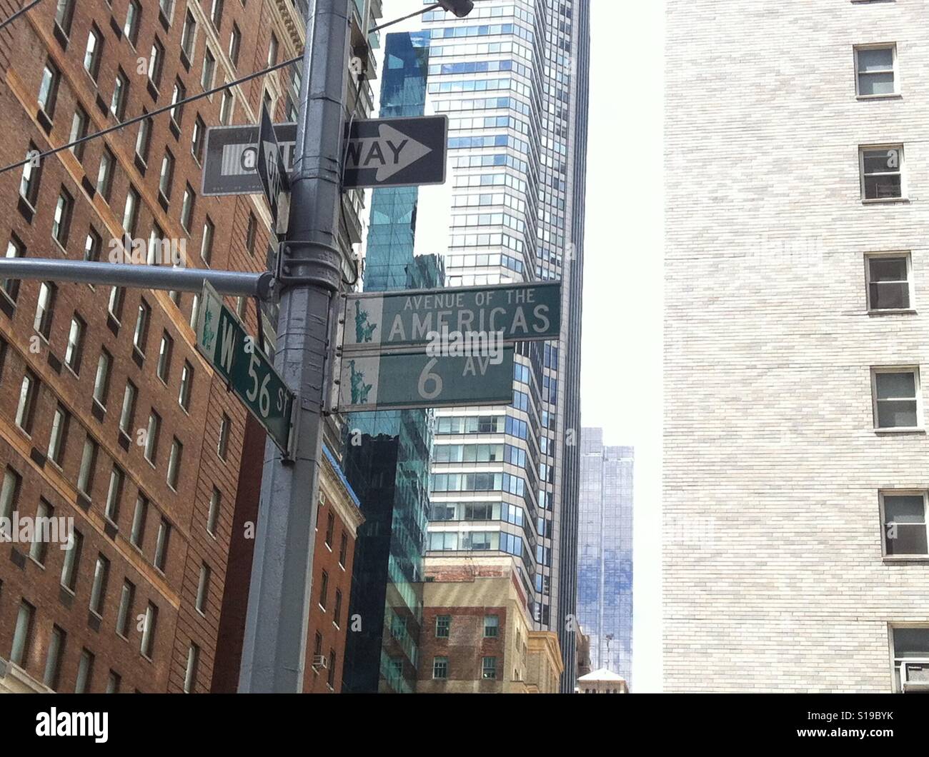 avenue of the americas street sign and buildings Stock Photo - Alamy