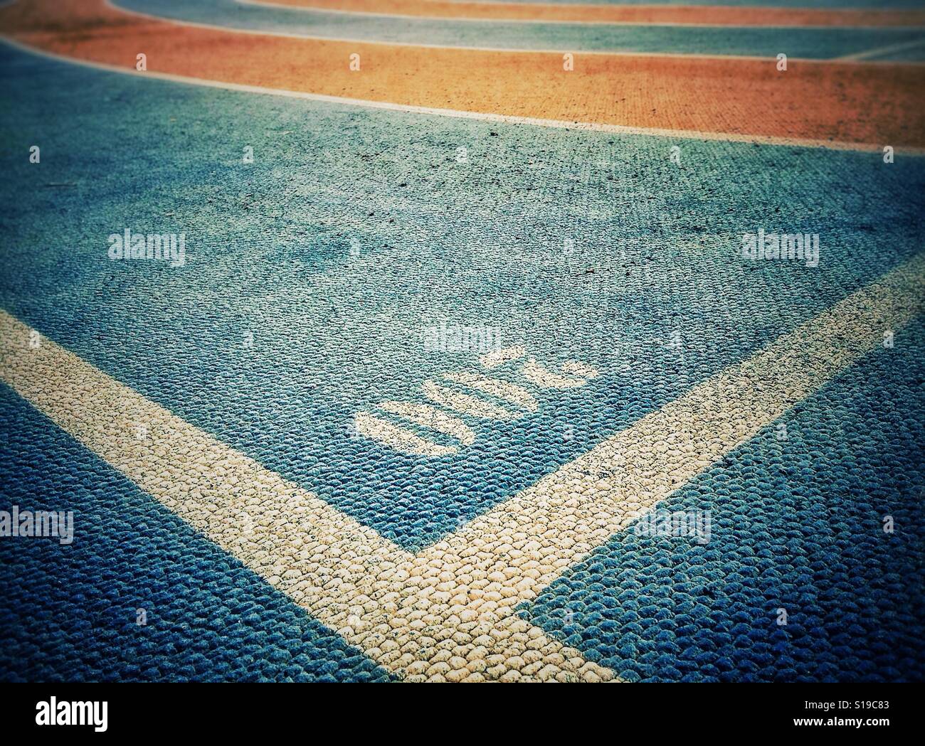Lines on athletic running track Stock Photo - Alamy