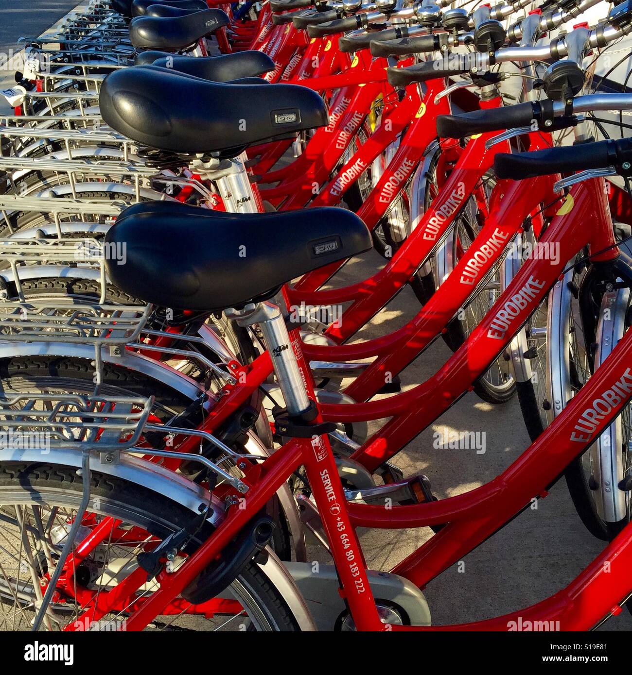 Row of colorful bicycles hi-res stock photography and images - Alamy