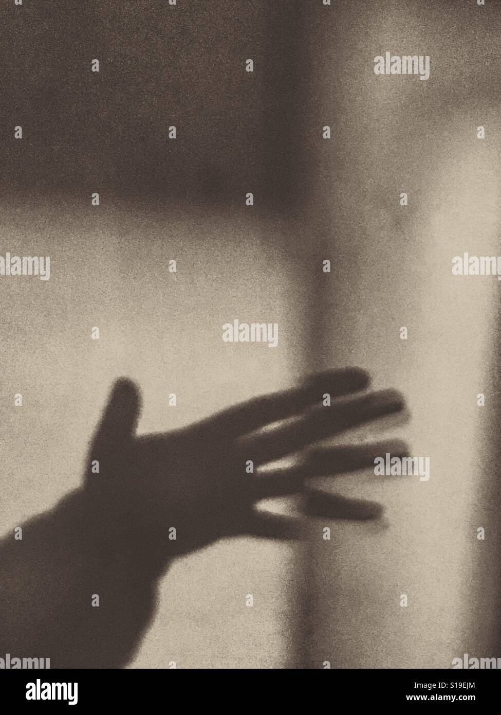 The shadow of a human hand Stock Photo - Alamy