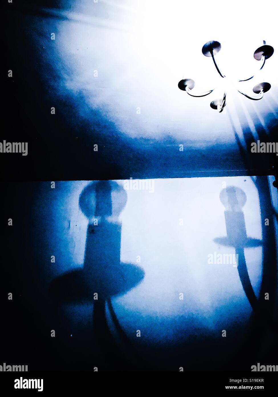 Lightbulb shadow on wall Stock Photo - Alamy