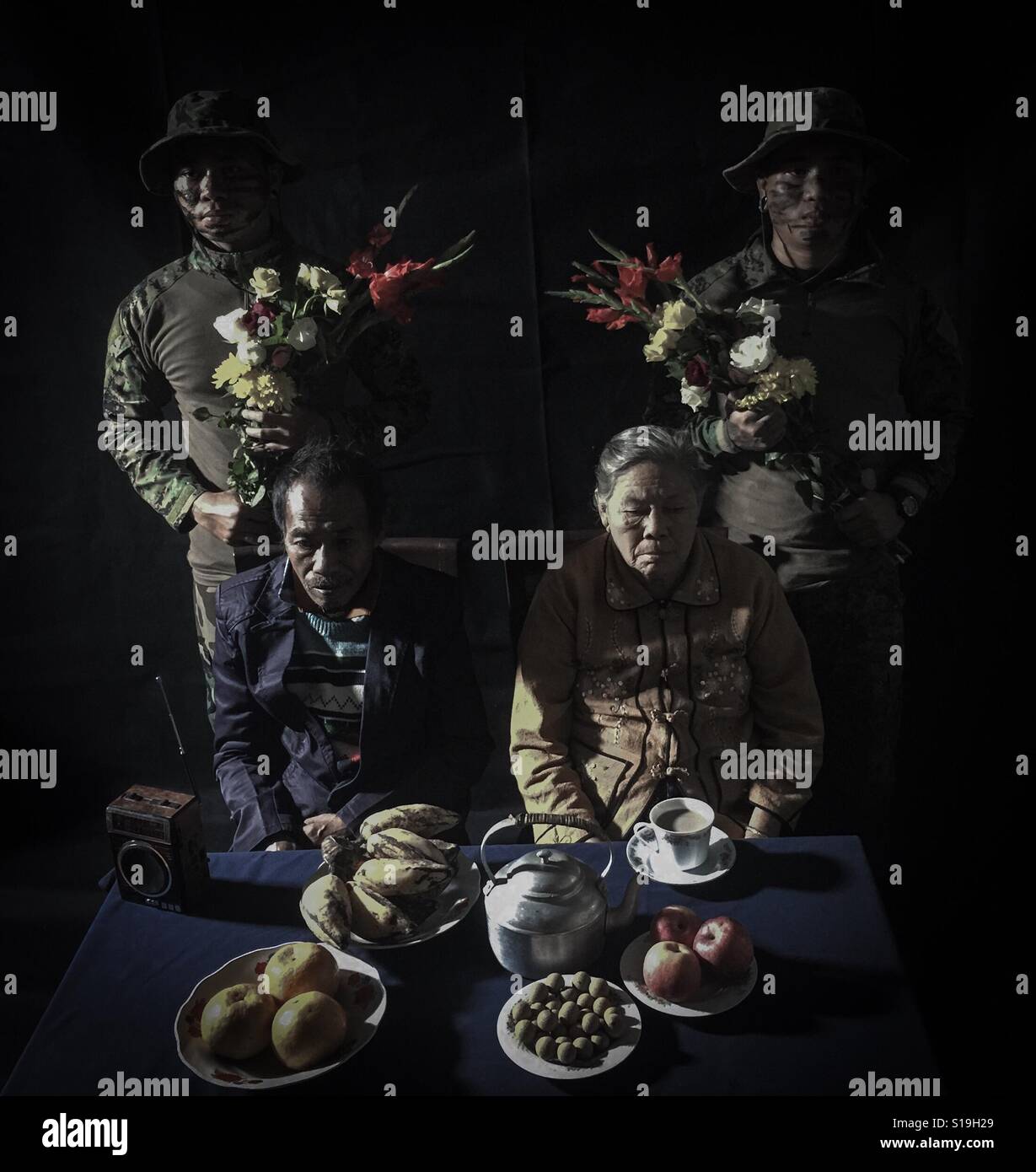 Flowers instead of guns hi-res stock photography and images - Alamy