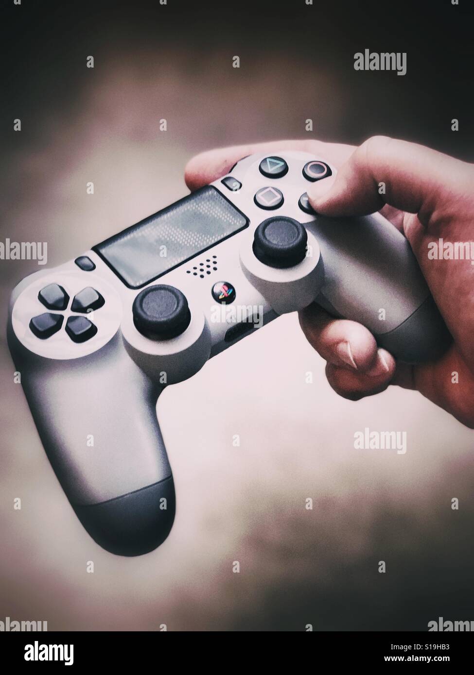 Holding playstation controller hi-res stock photography and images - Alamy